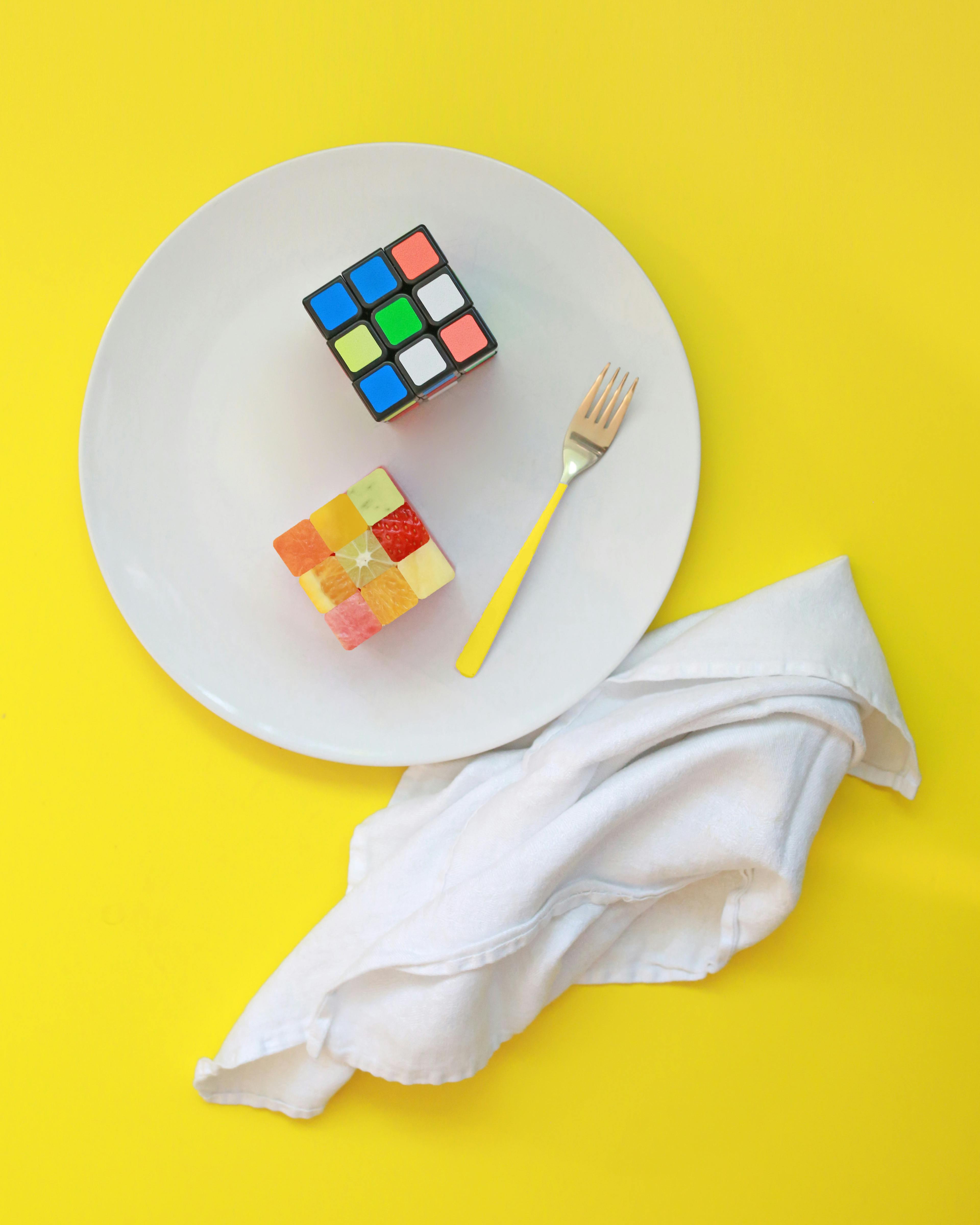 Rubik's Cube on a White Plate · Free Stock Photo