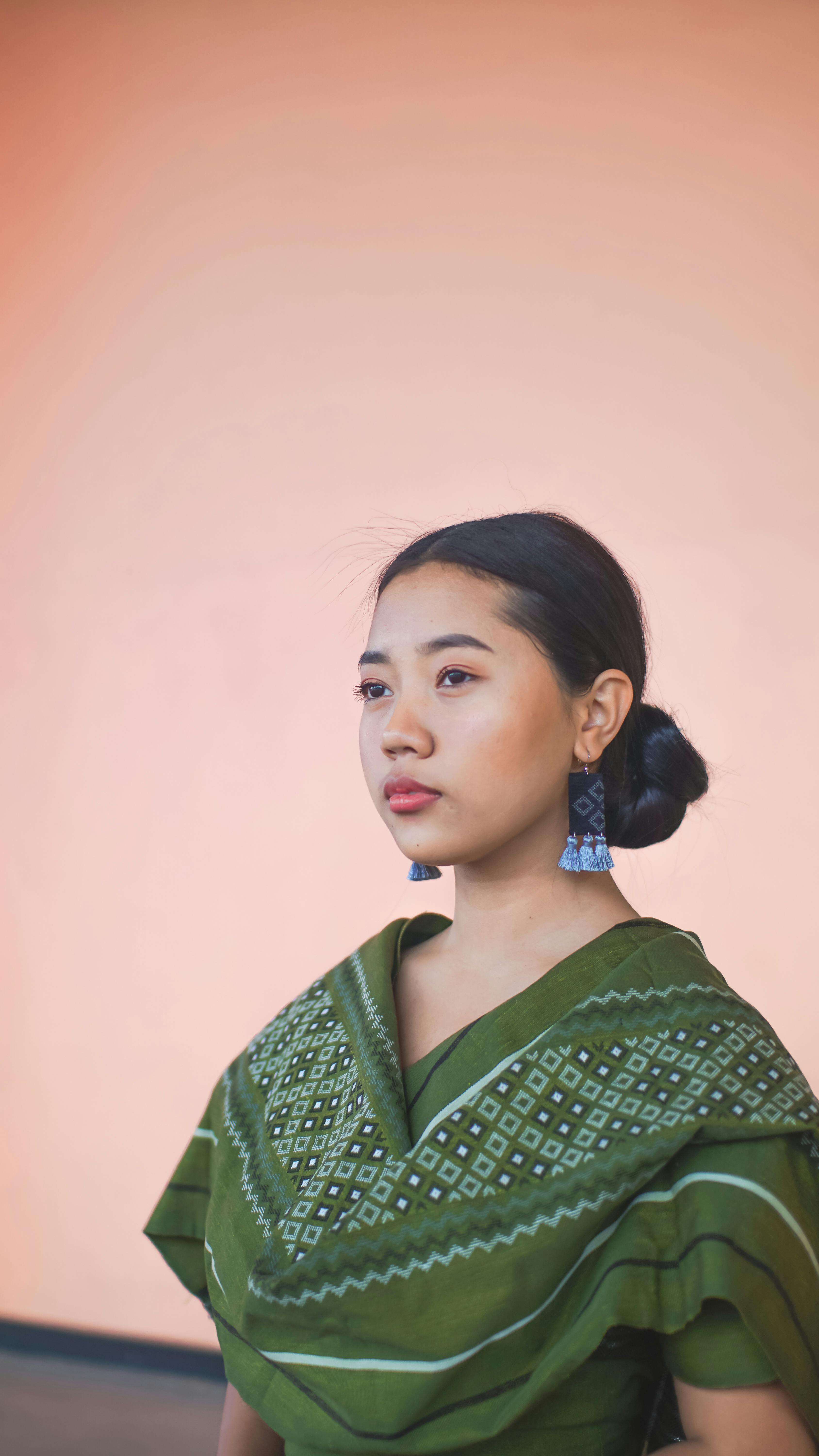 Woman in Green Traditional Clothing · Free Stock Photo