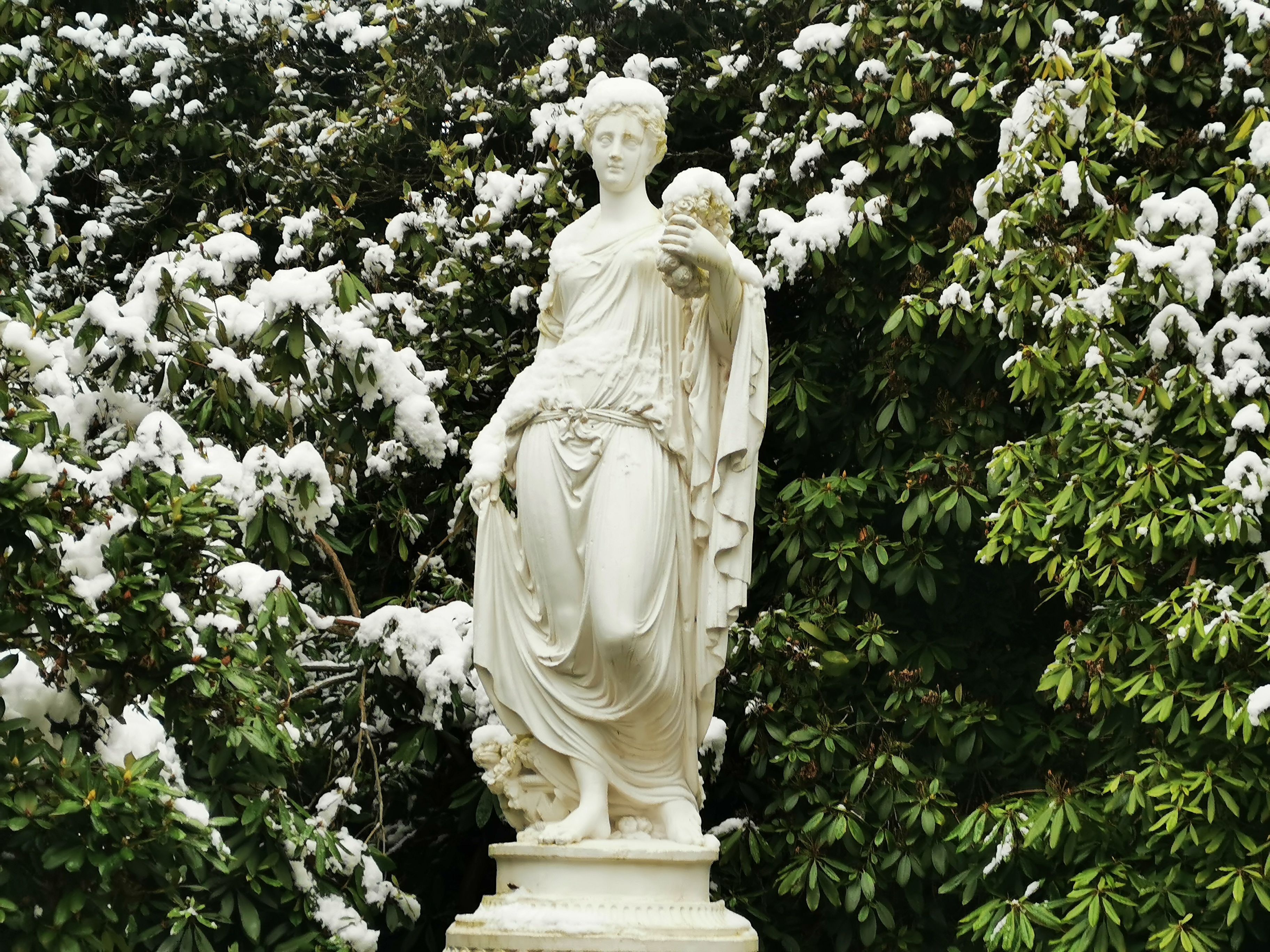 White Concrete Statue of a Woman · Free Stock Photo