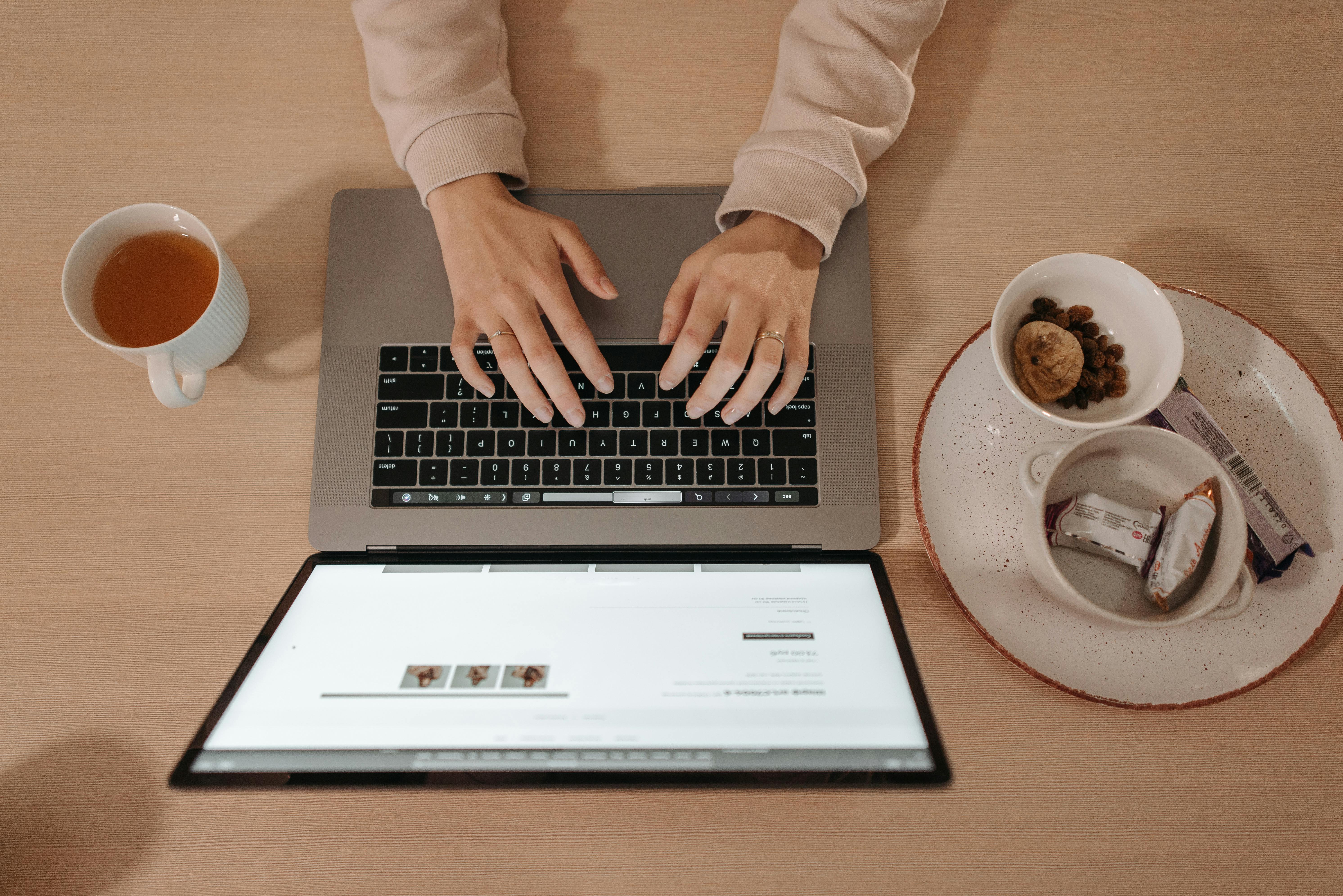 Photo Of Woman Using Her Laptop · Free Stock Photo