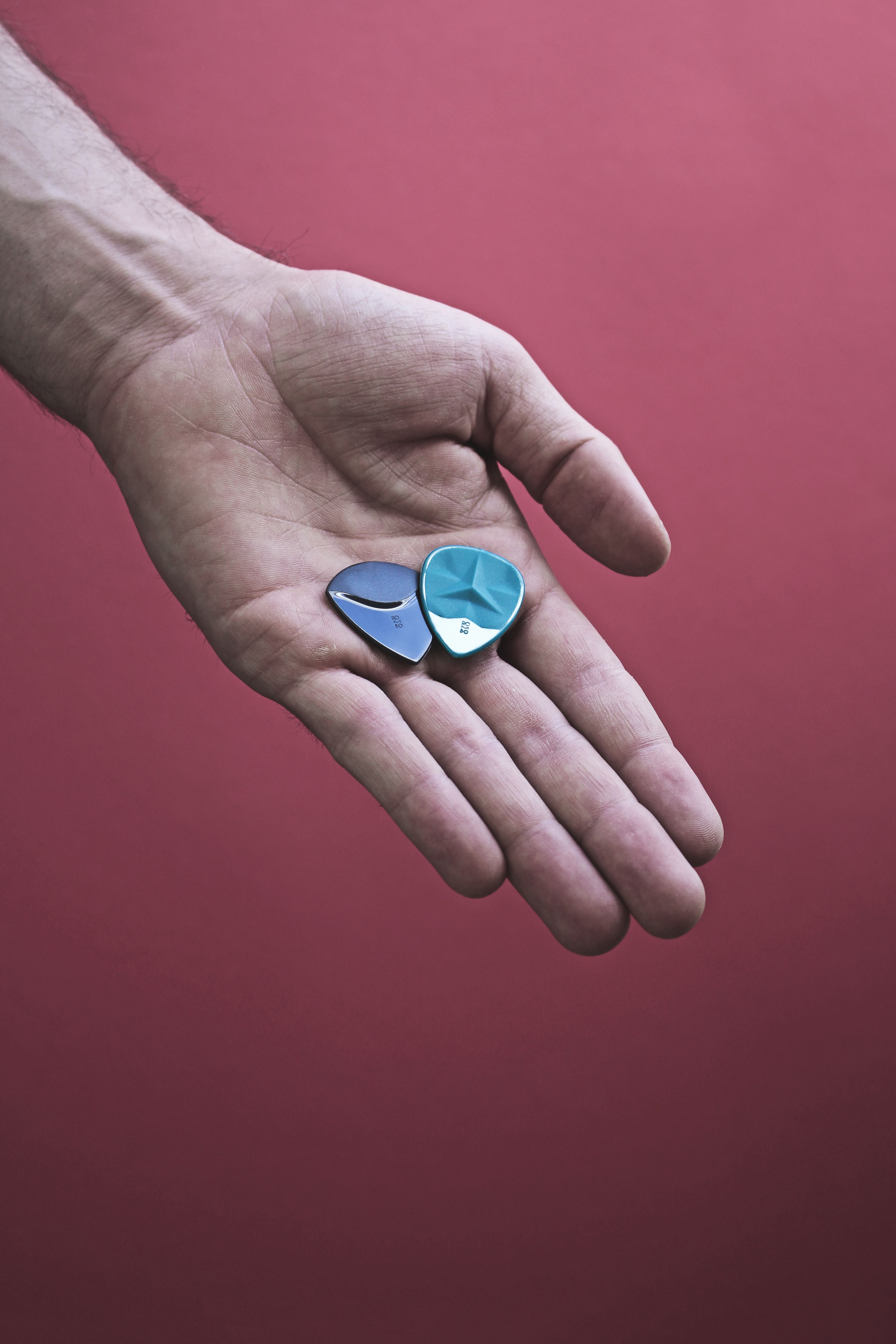 Guitar Picks on Person's Hand · Free Stock Photo