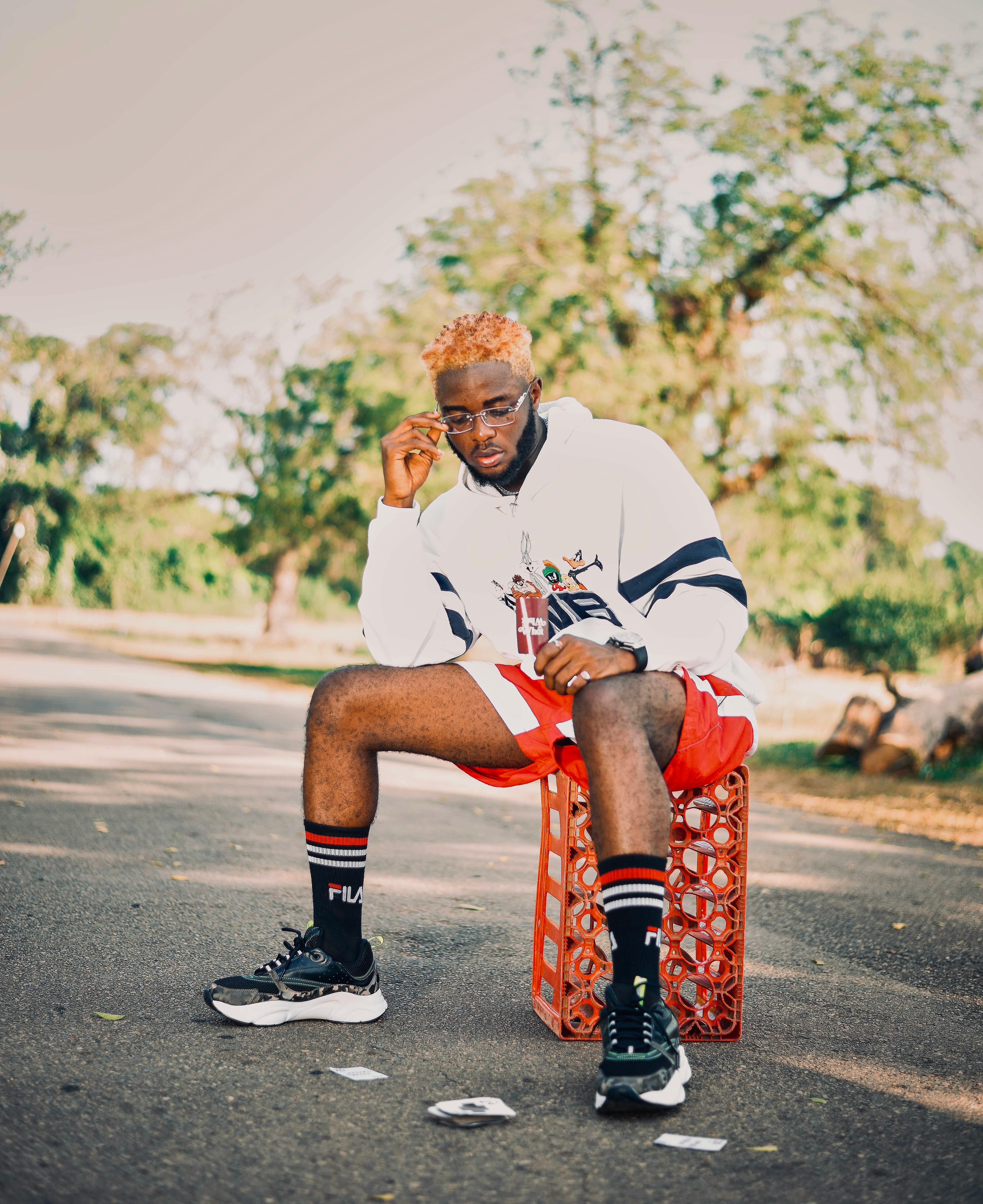 Faceless black man in hoodie · Free Stock Photo