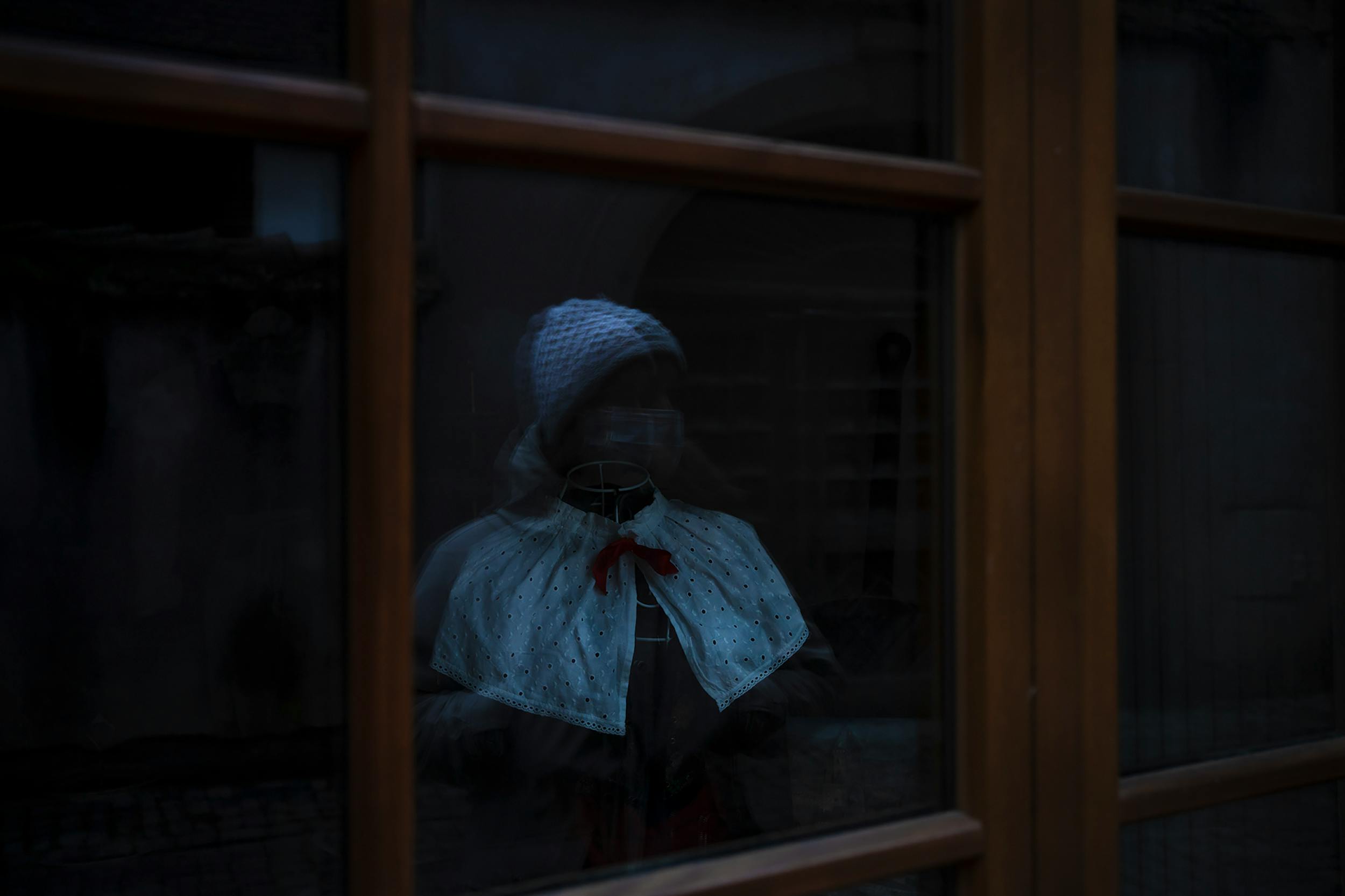 A Mannequin Behind a Window · Free Stock Photo