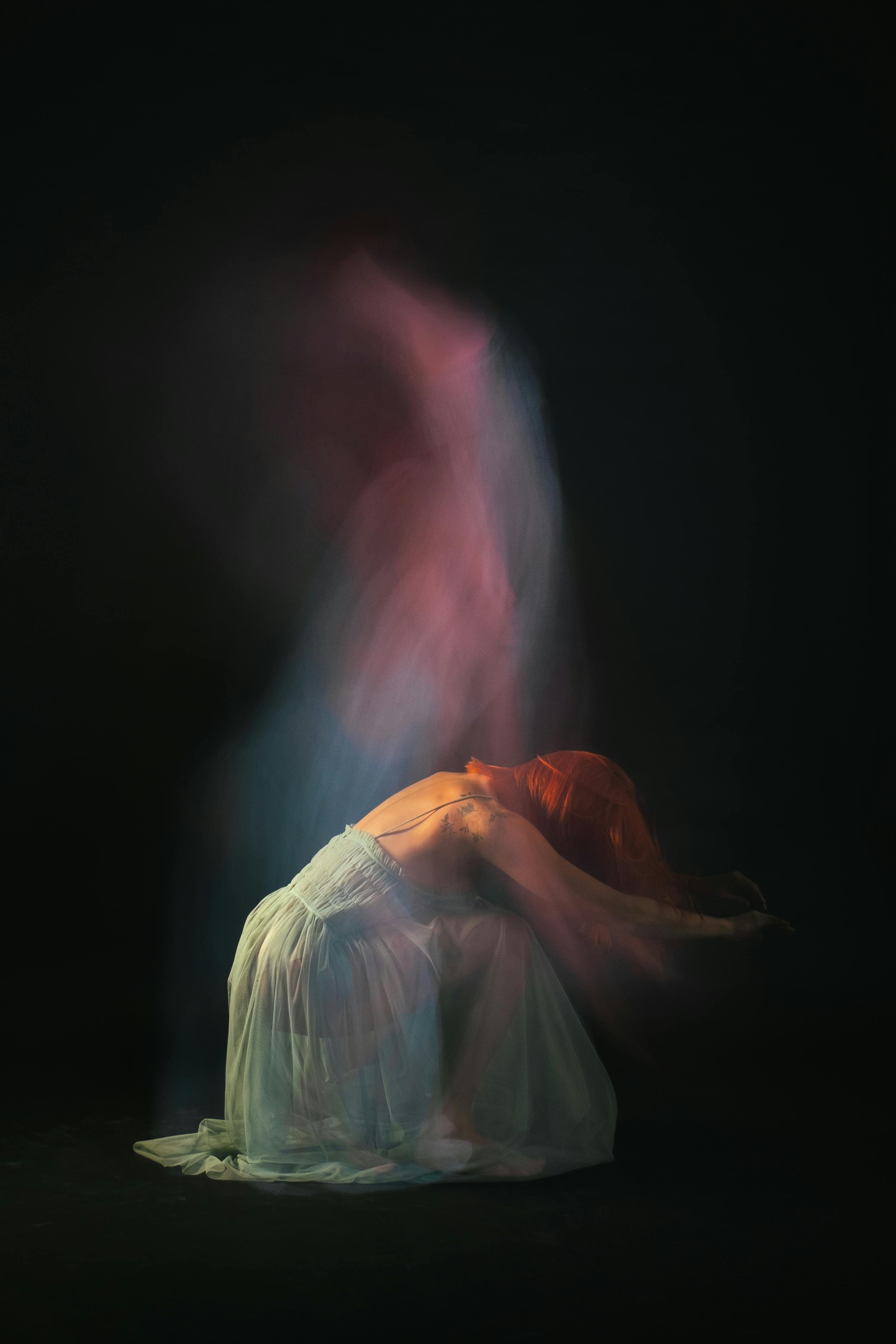 Brunette Woman Dancing with Messy Hair · Free Stock Photo