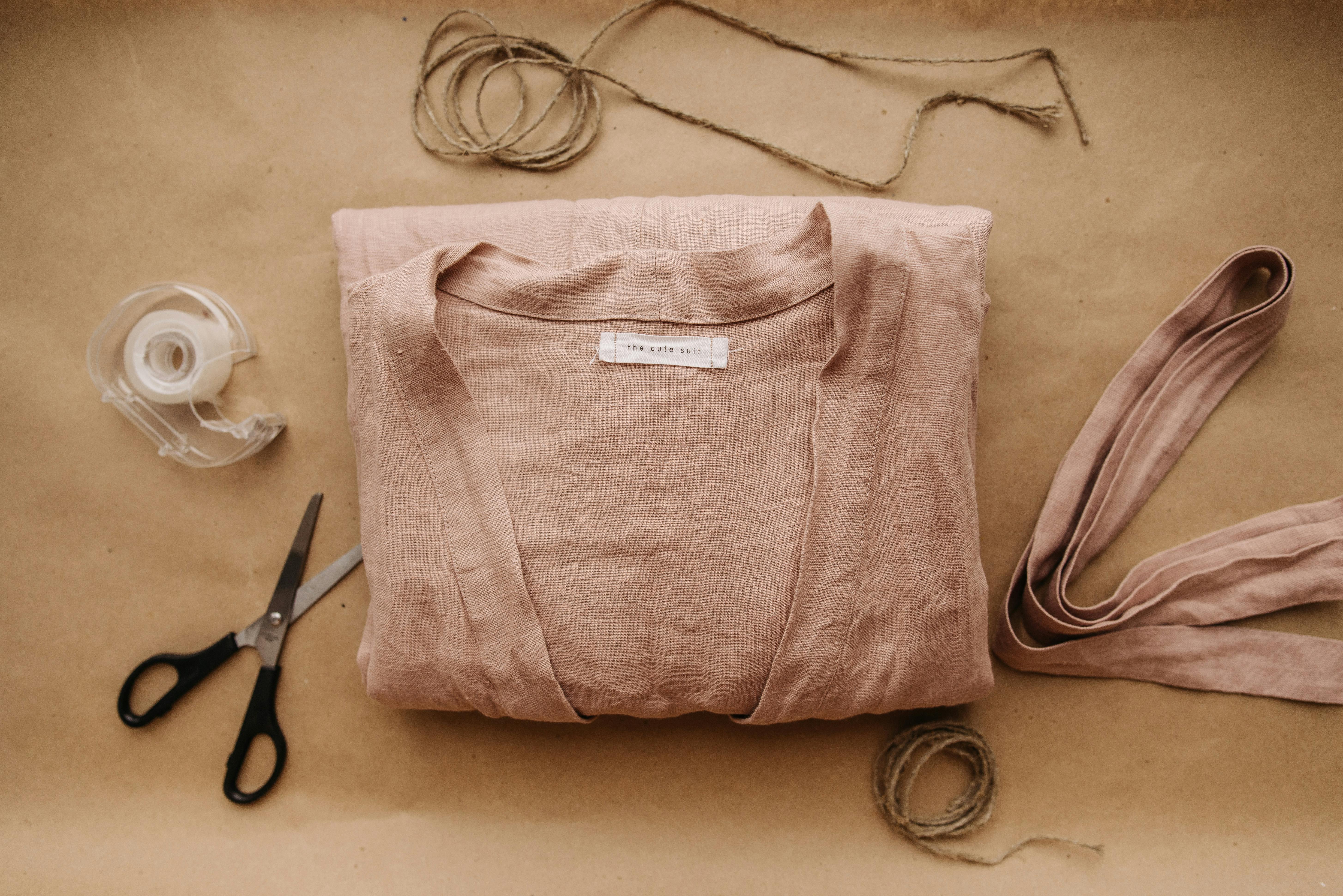 Overhead Shot of Clothing on a Work Table · Free Stock Photo
