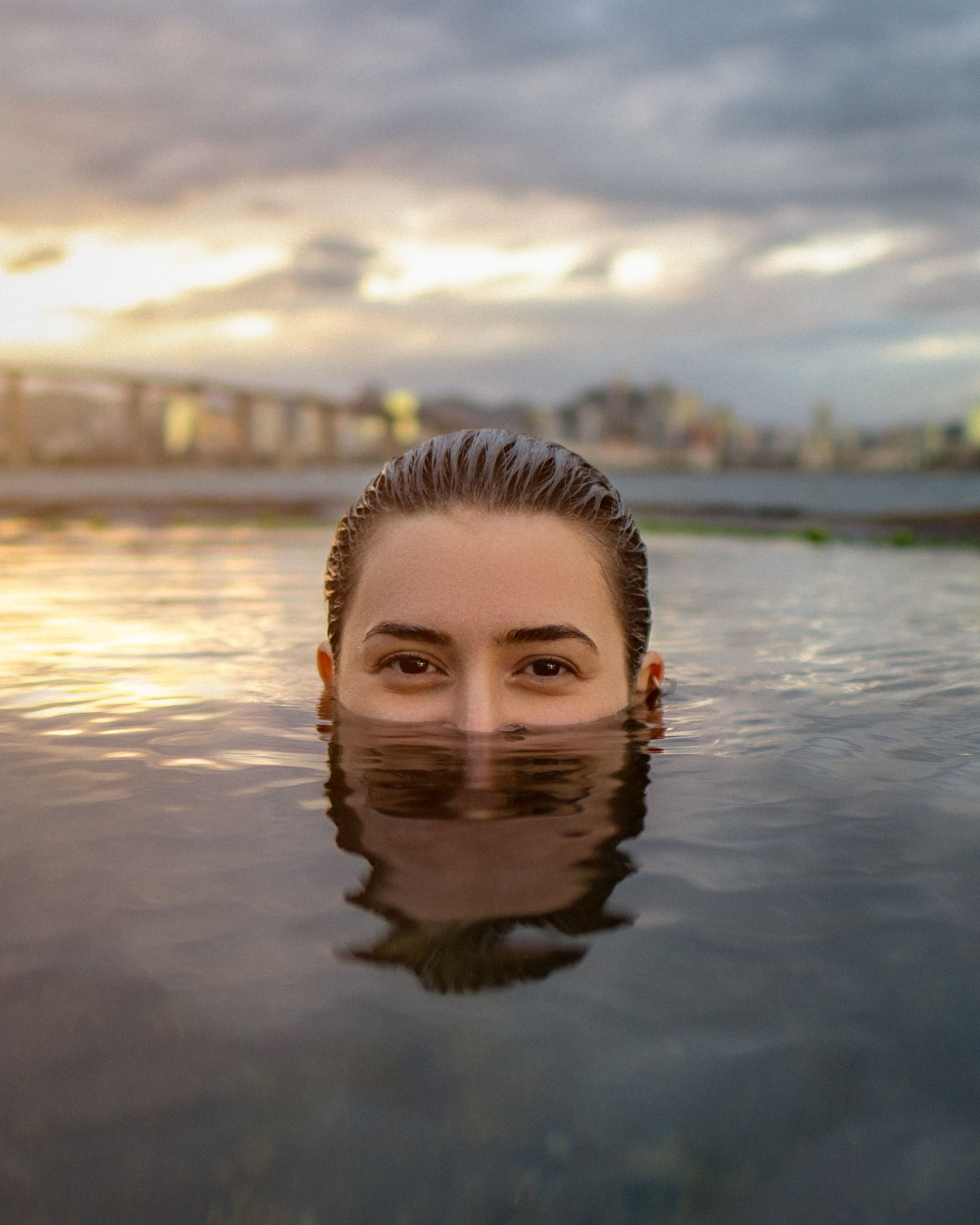 Woman Lurking from Water · Free Stock Photo