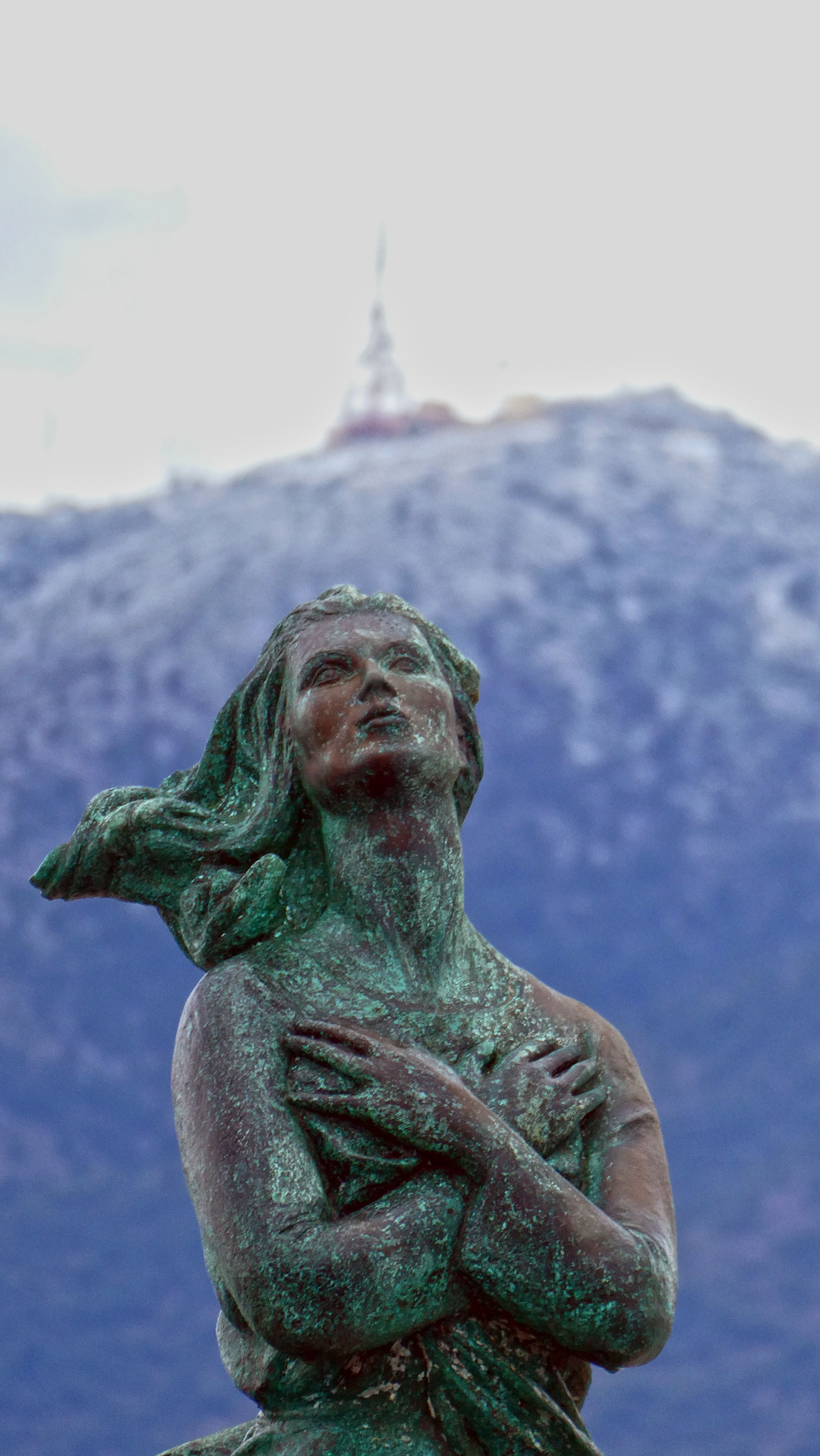 Statue of a Woman with Hands on Chest · Free Stock Photo