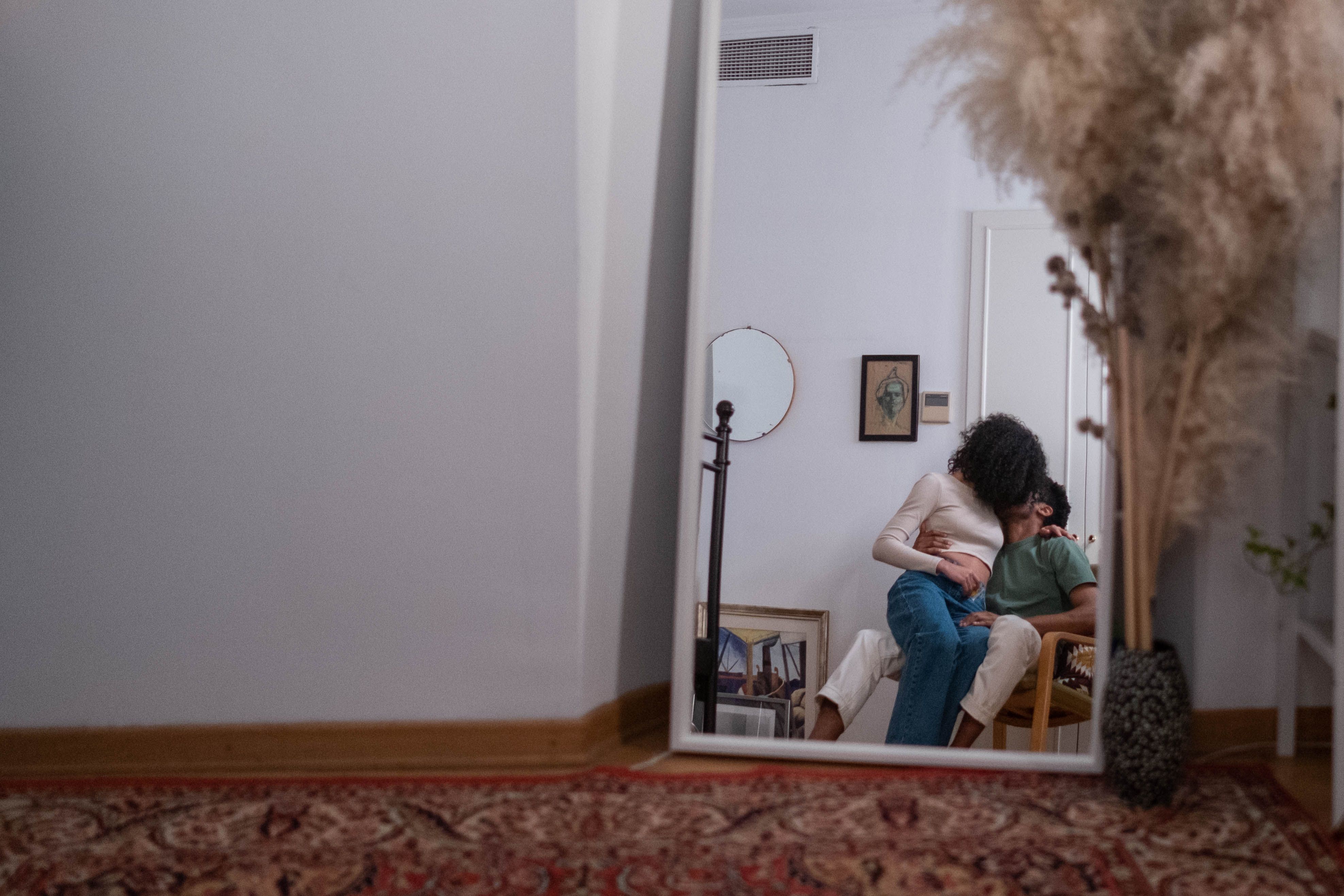 Mirror Reflection of a Couple Kissing · Free Stock Photo