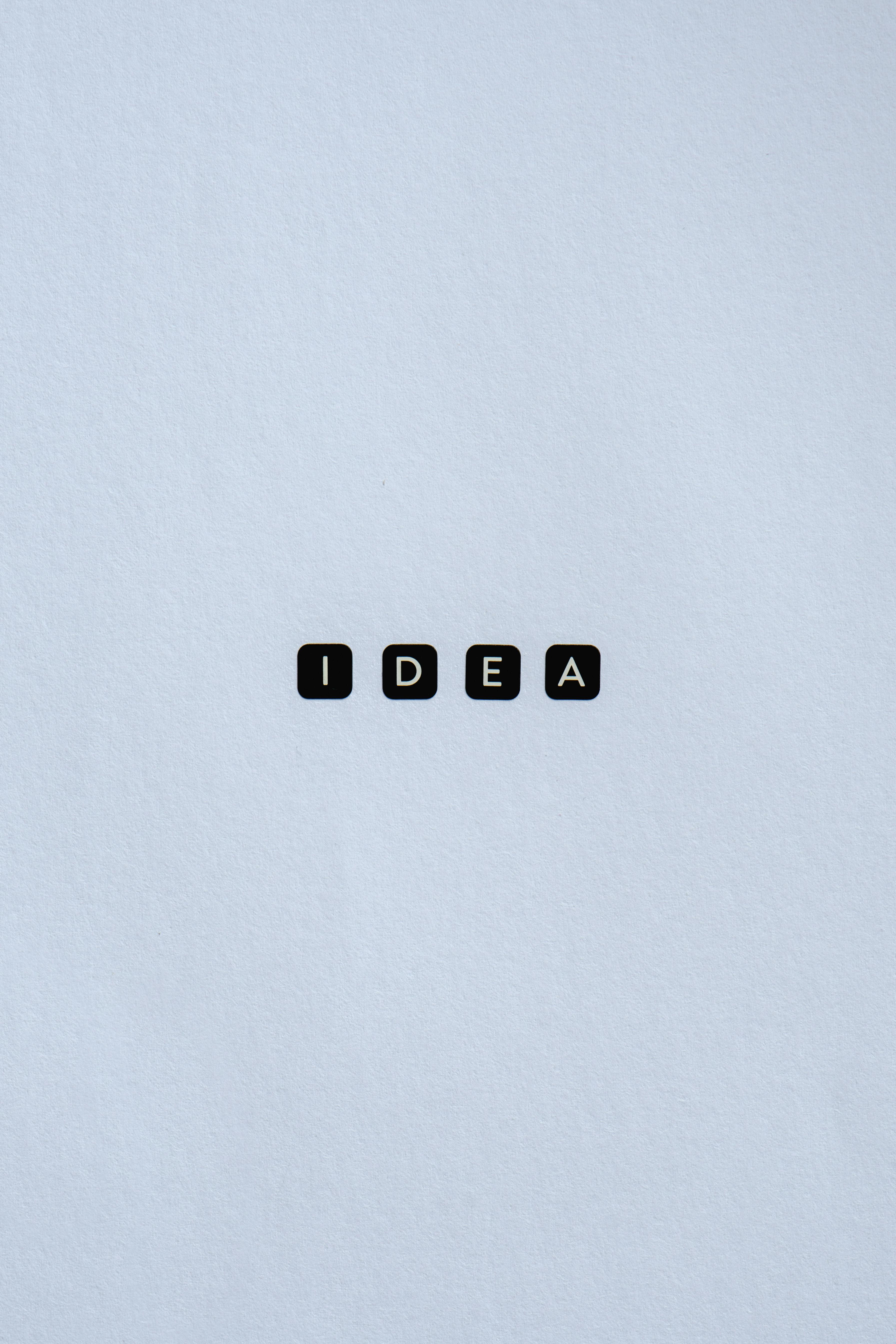 Black Letters on a Blue Background · Free Stock Photo