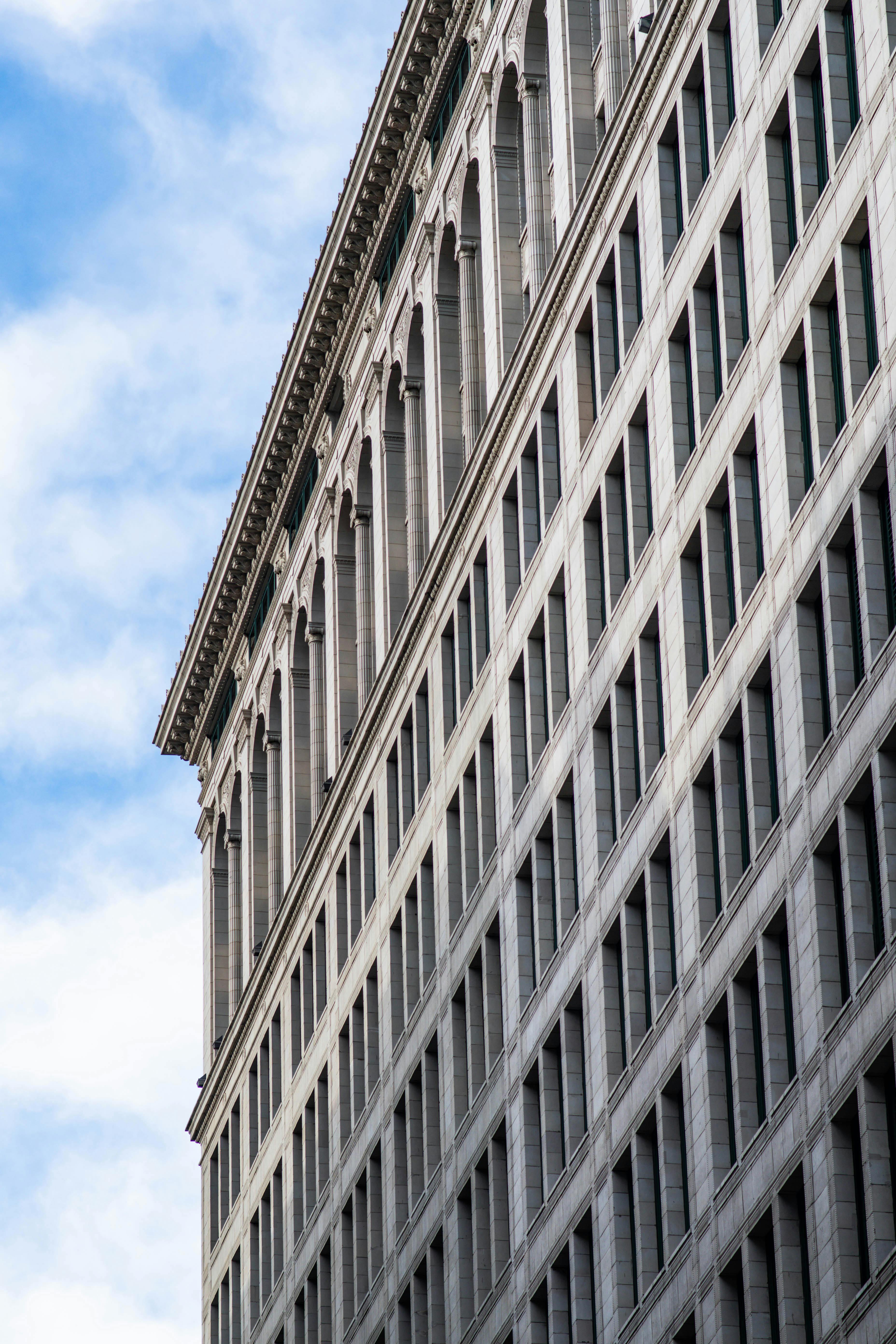 Low-Angle Shot of Concrete Buildings · Free Stock Photo