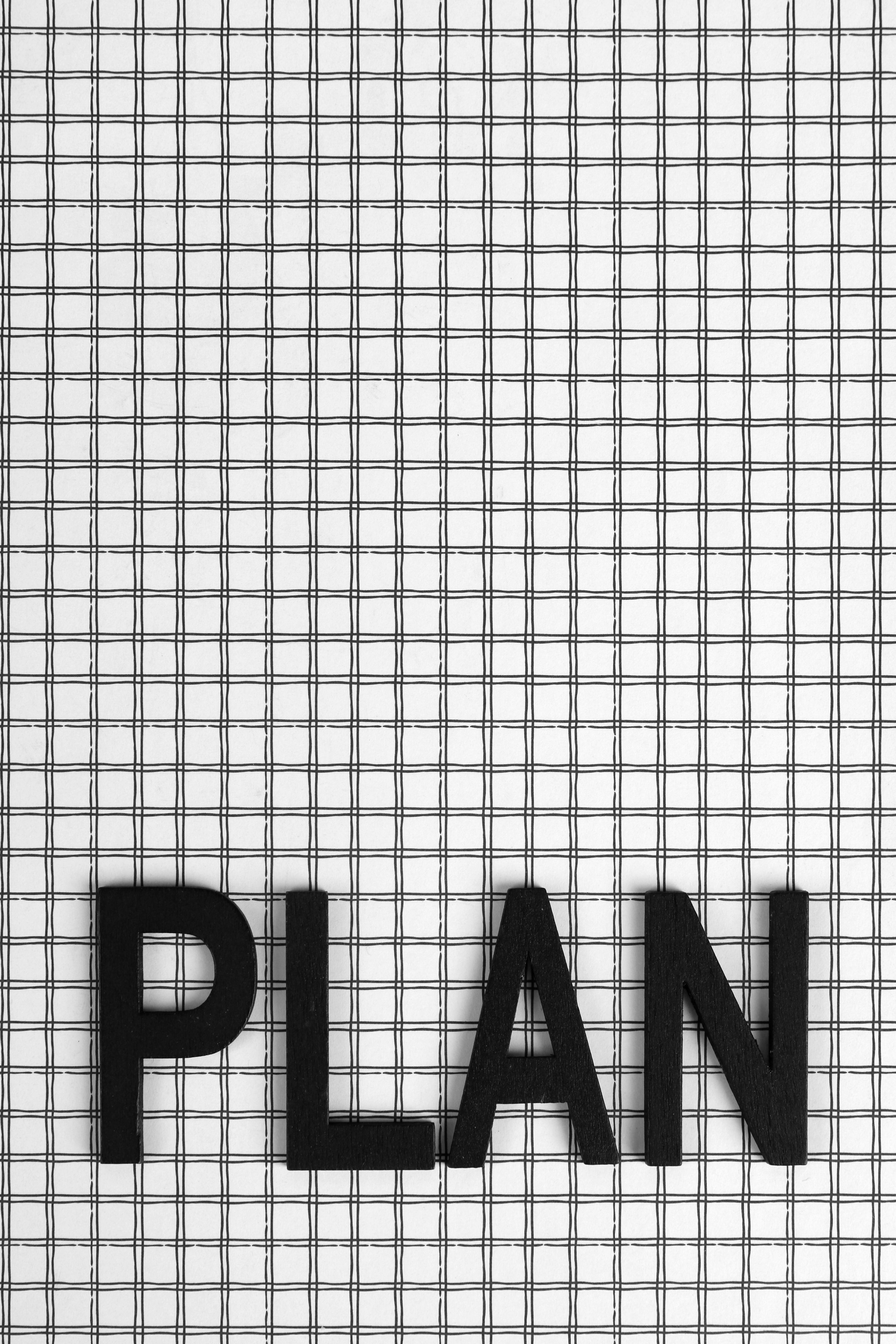 Plan Text on a Grid · Free Stock Photo