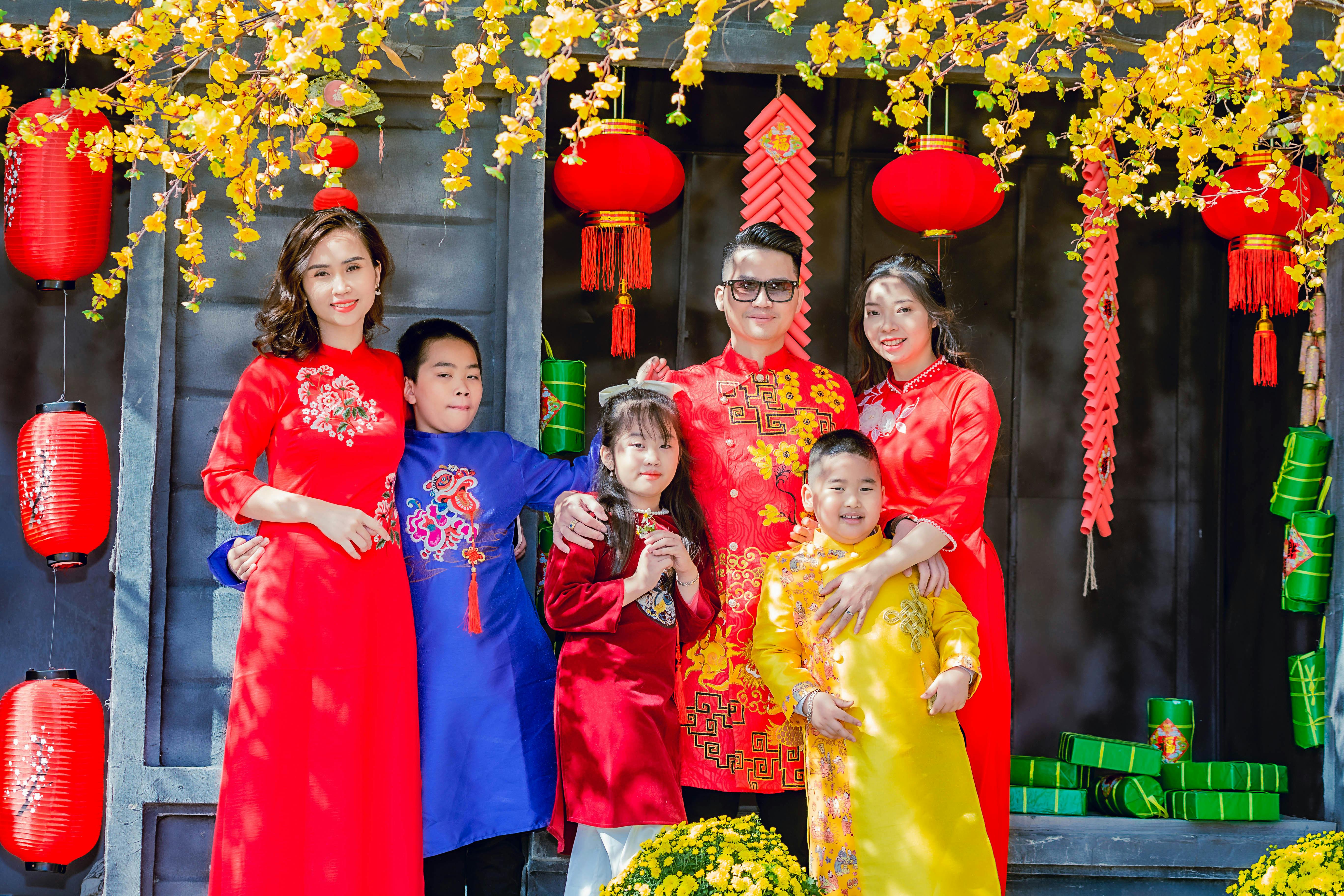 Asian Family Wearing Traditional Clothes · Free Stock Photo