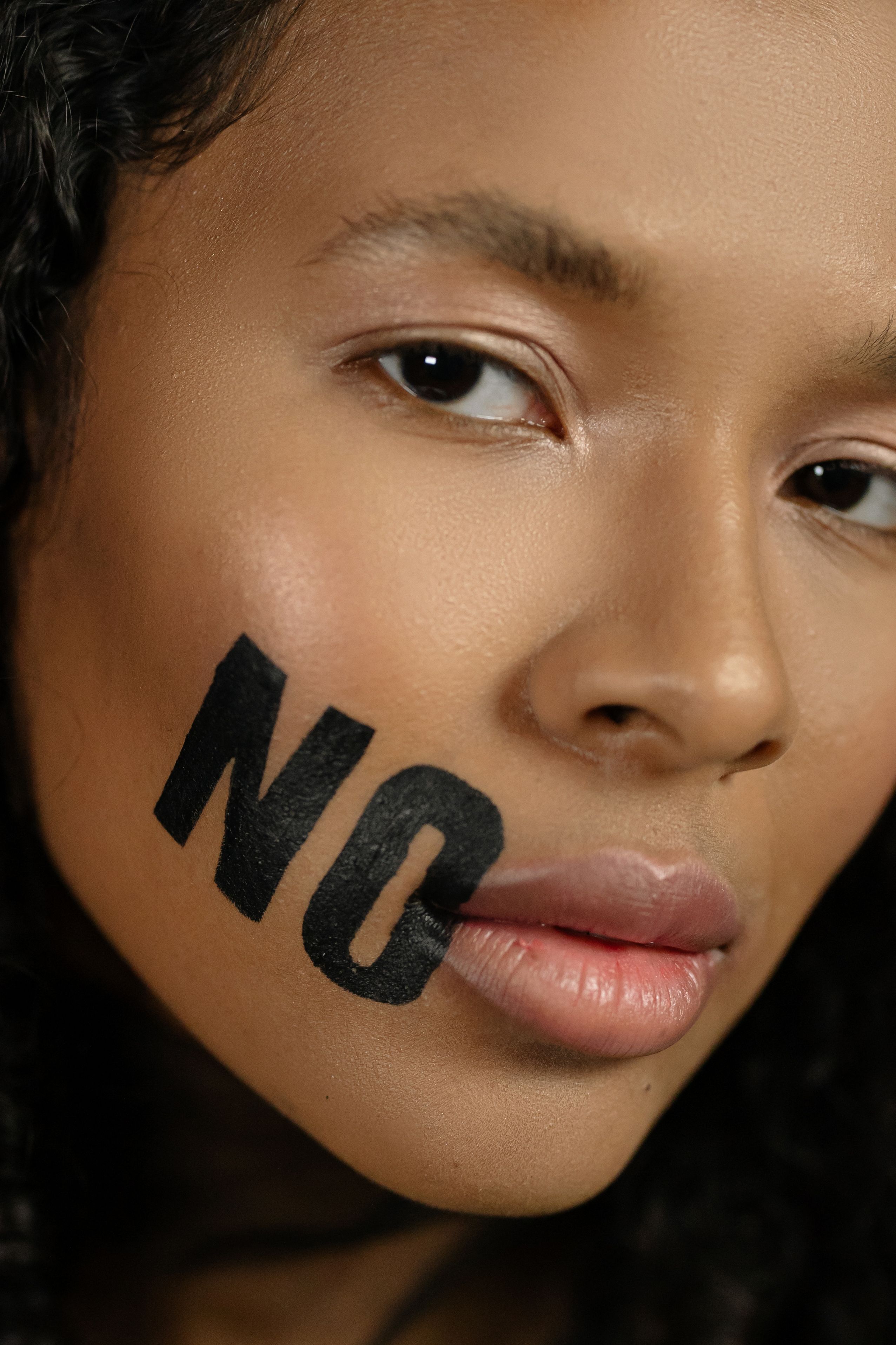 A Person Holding her Leg · Free Stock Photo
