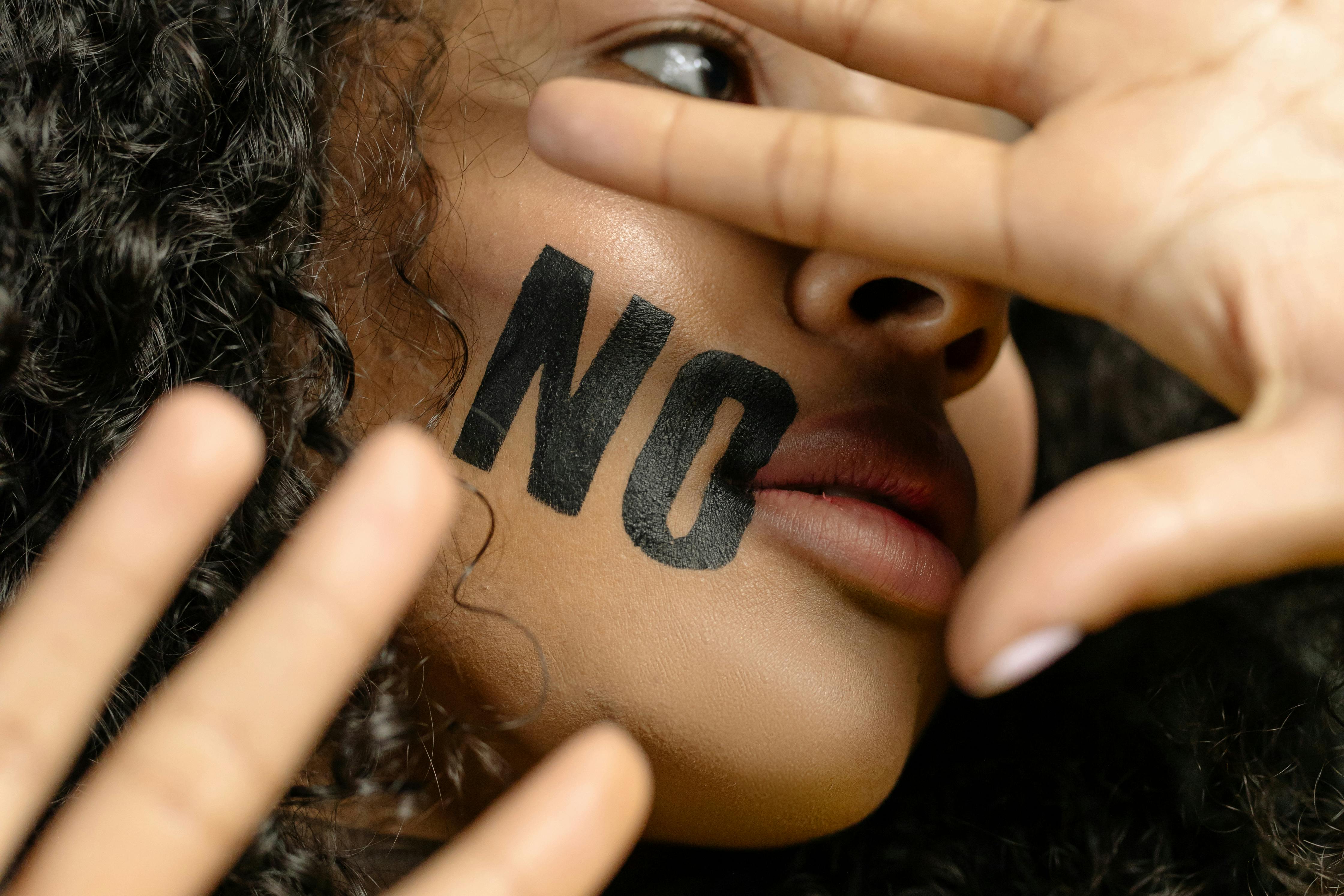 Close Up Photo of Hands Near a Woman's Face · Free Stock Photo