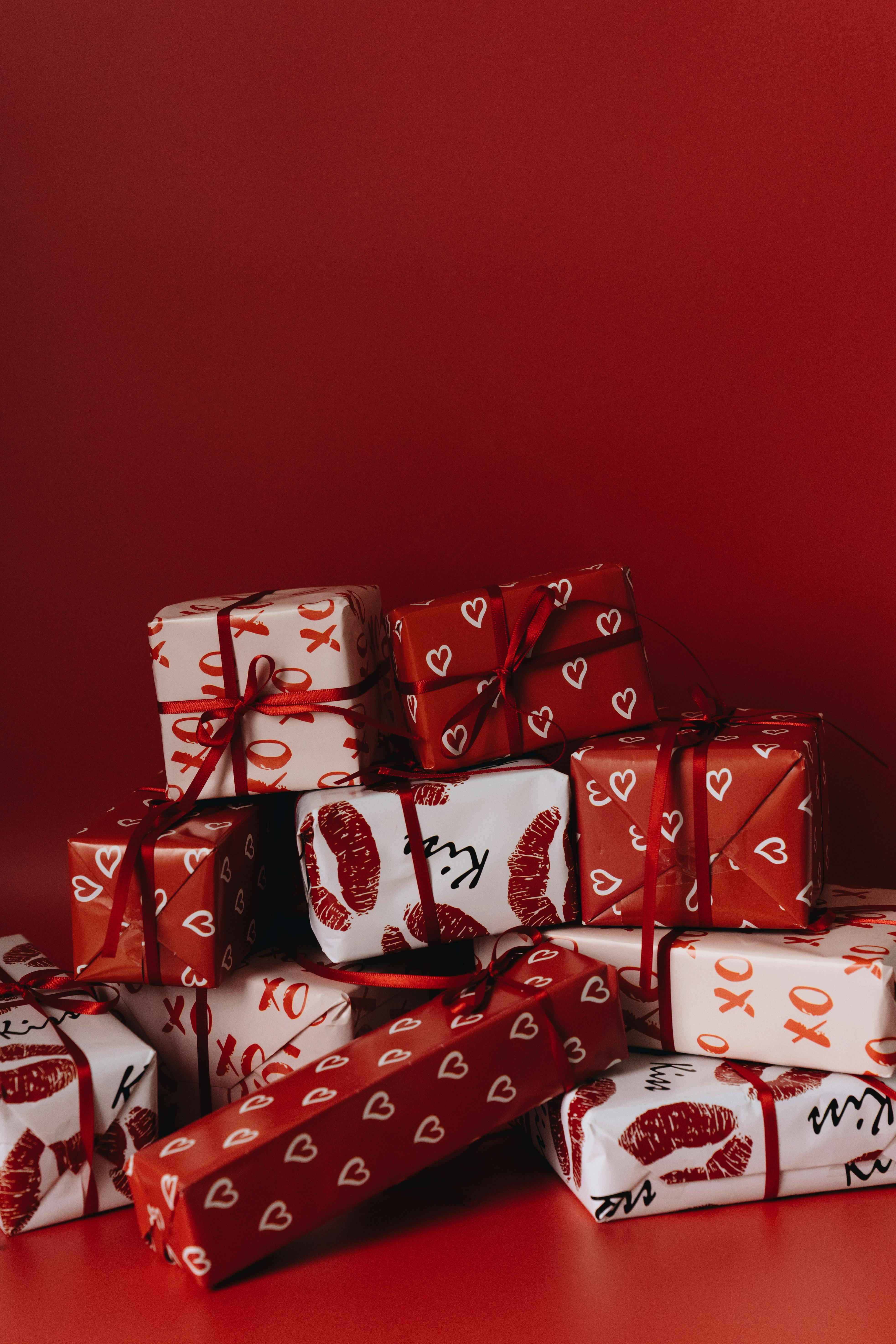 Red Gift Boxes on Red Surface · Free Stock Photo