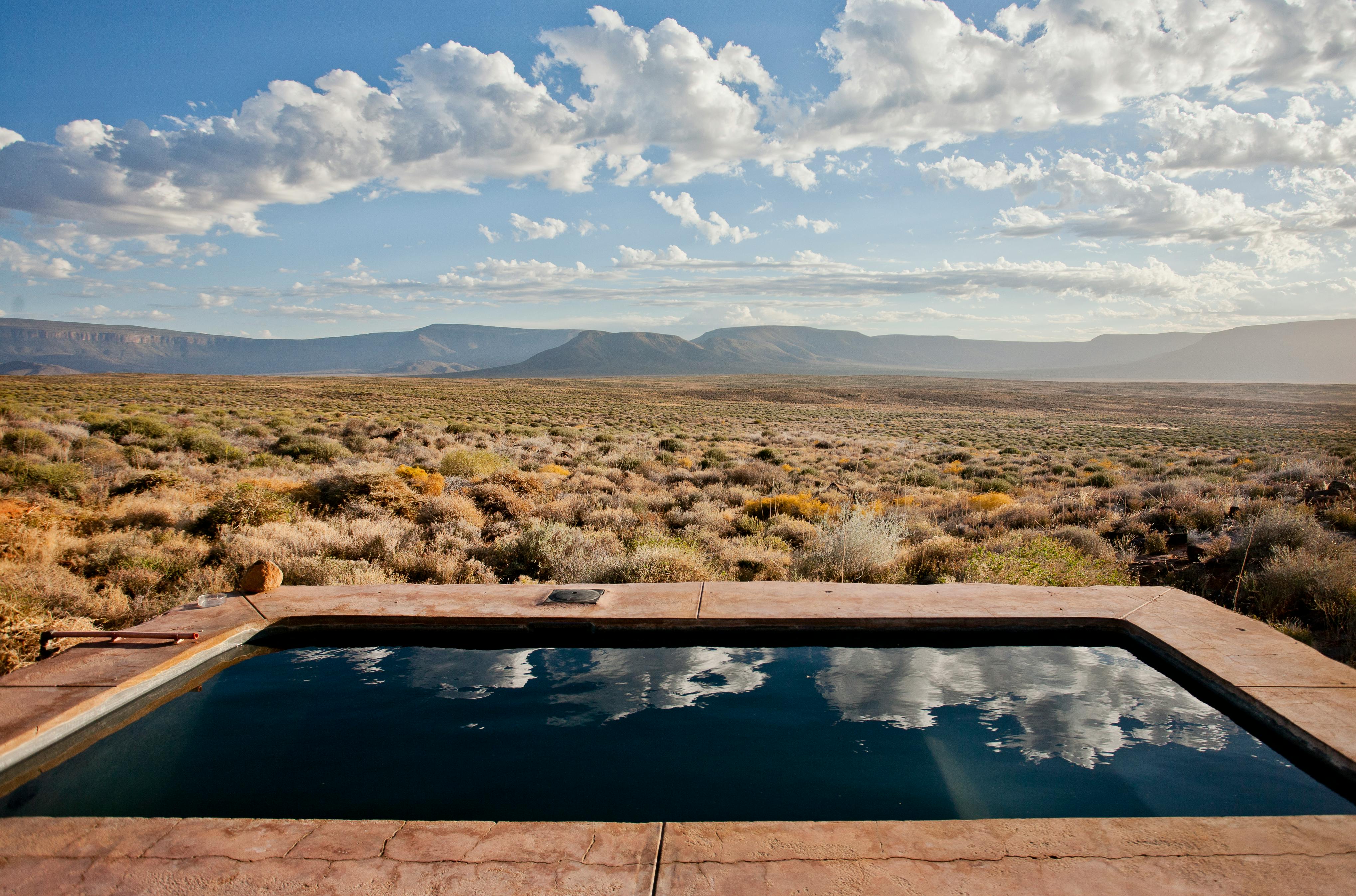 Dug Out Pool in Desert · Free Stock Photo