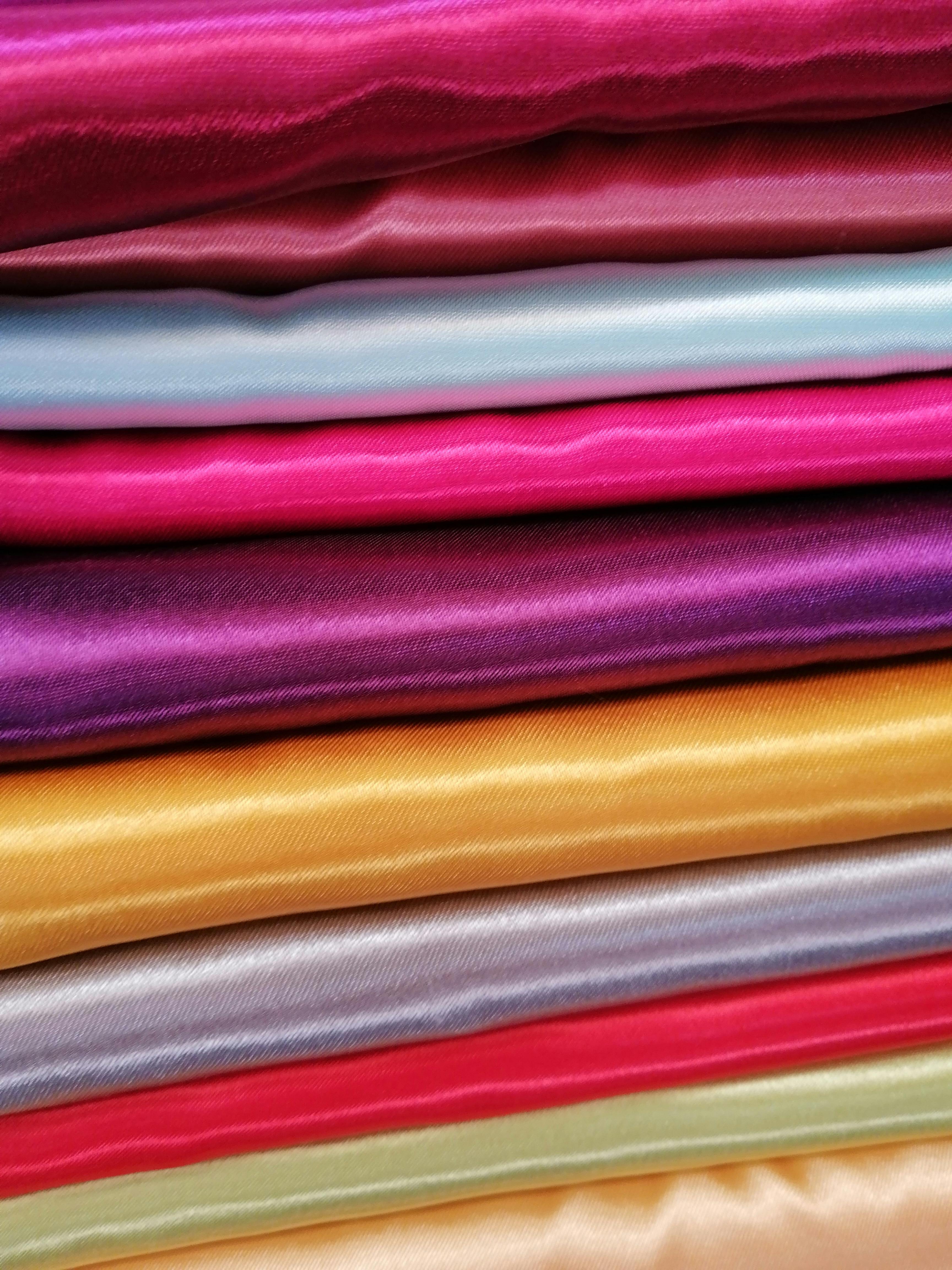 Folded and Stacked Fabric · Free Stock Photo