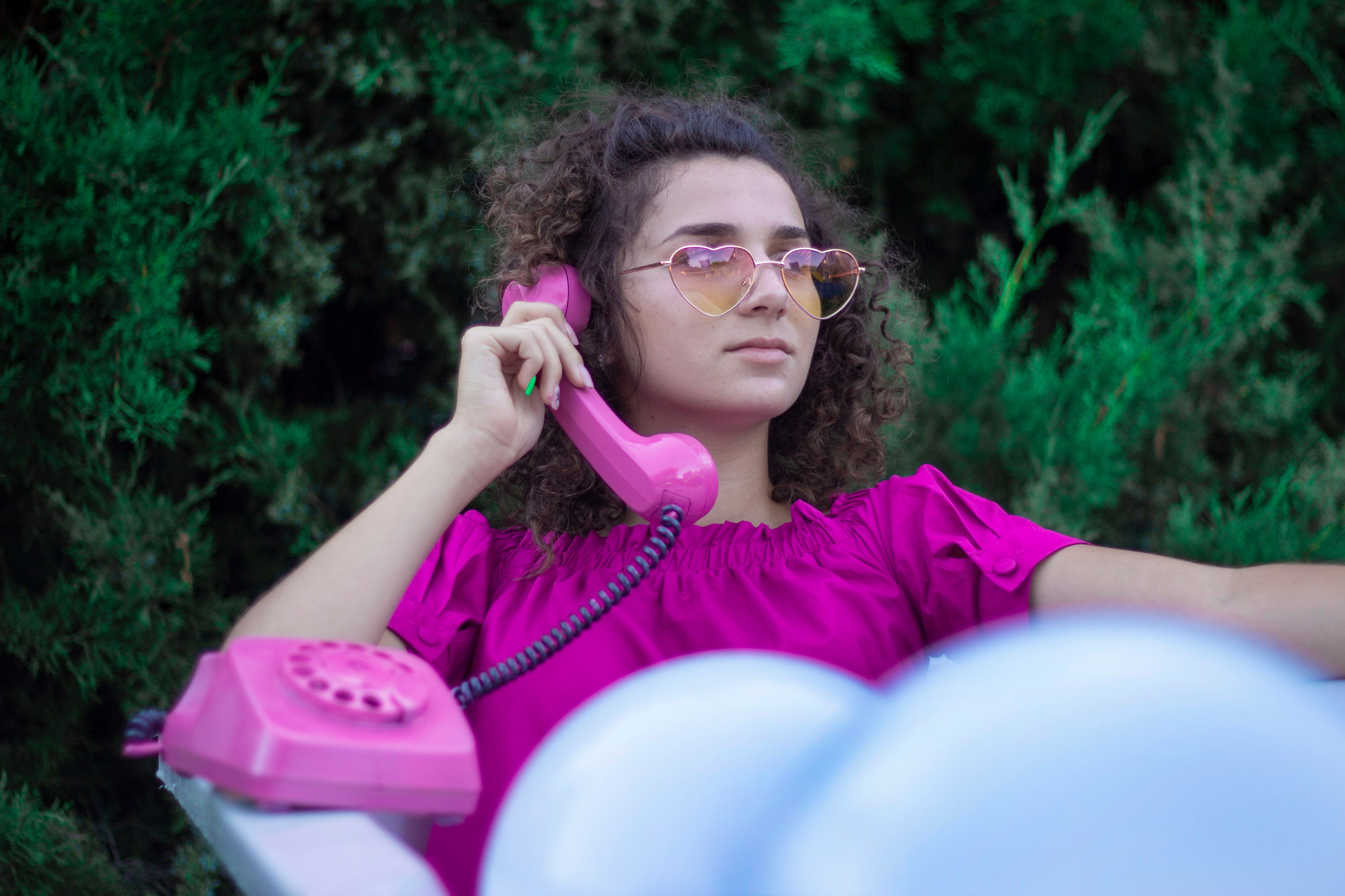 Woman Holding Rotary Phone · Free Stock Photo