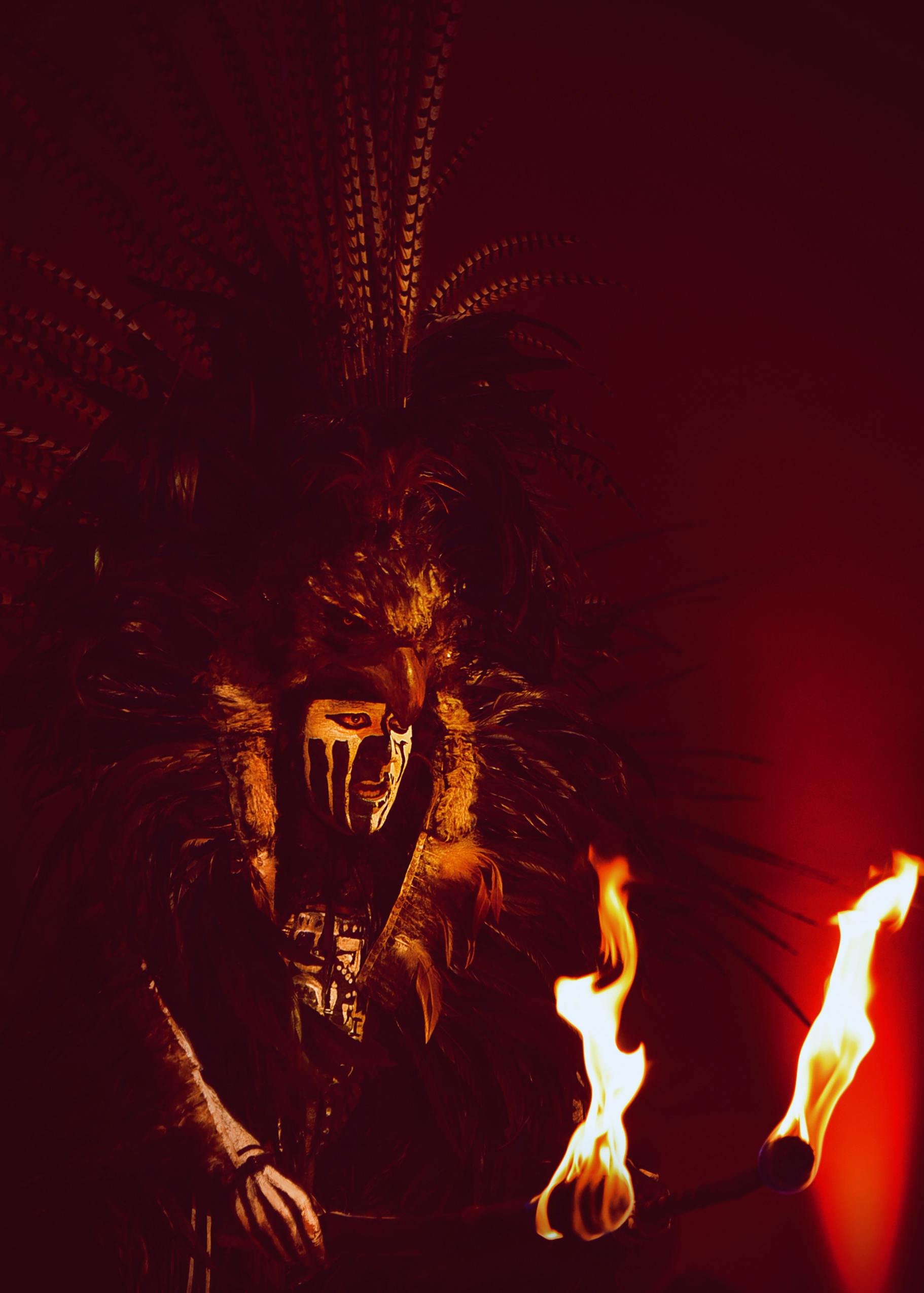 Man Wearing a Costume Dancing with Fire · Free Stock Photo