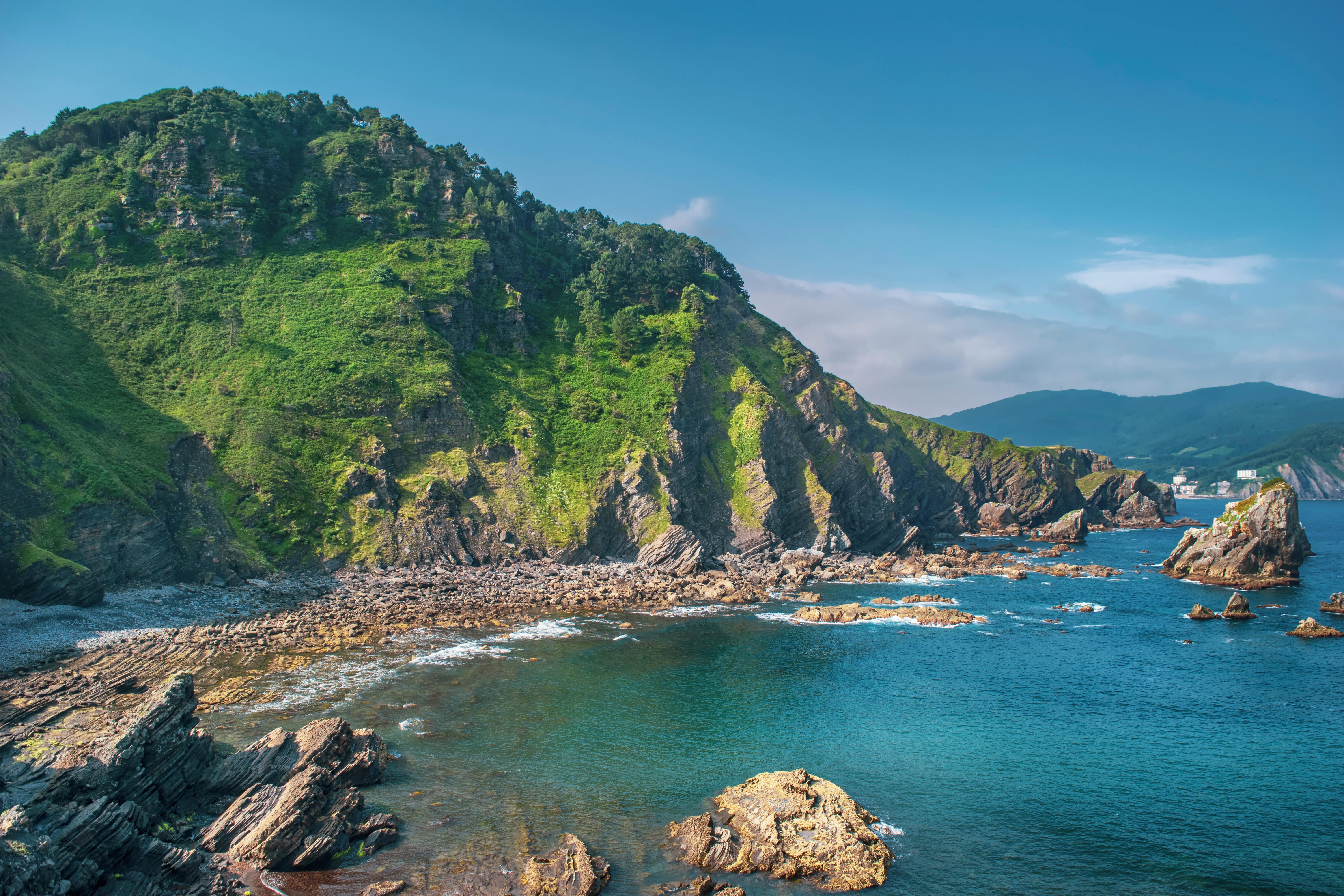 Aerial Shot of A Rocky Coast · Free Stock Photo
