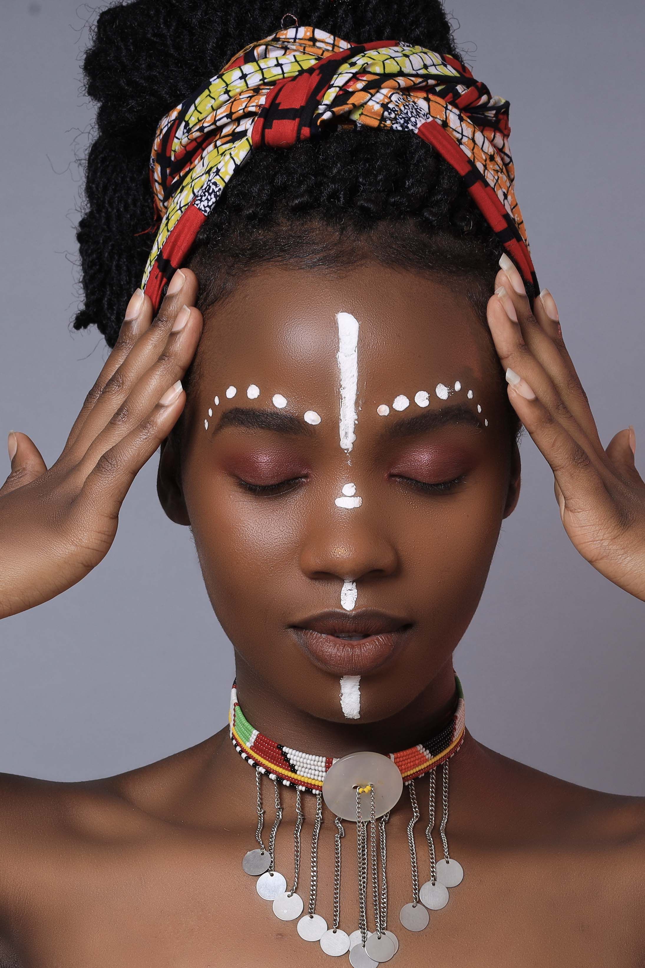 A Woman with White Face Paint · Free Stock Photo