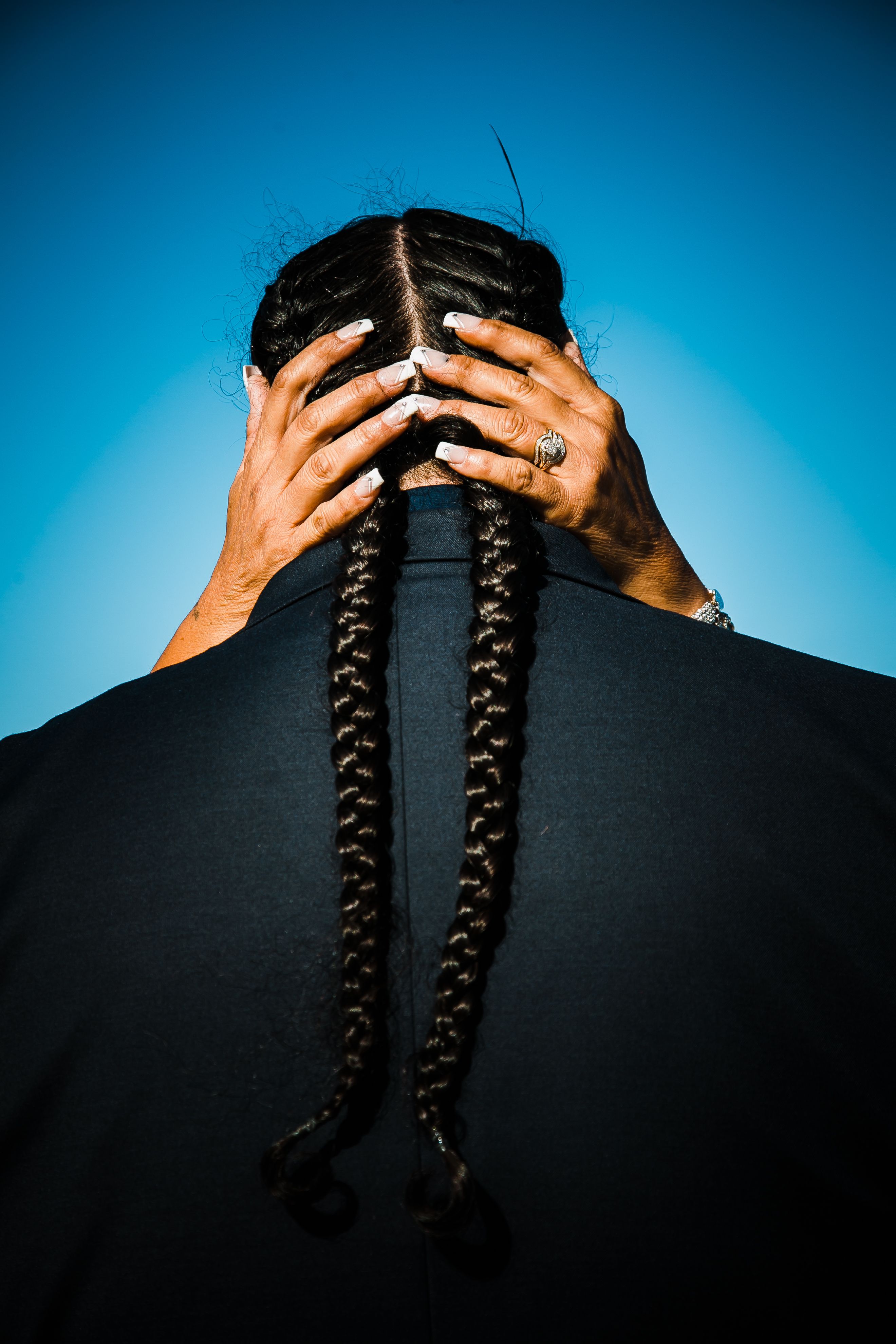 Shy woman covering face with hands · Free Stock Photo