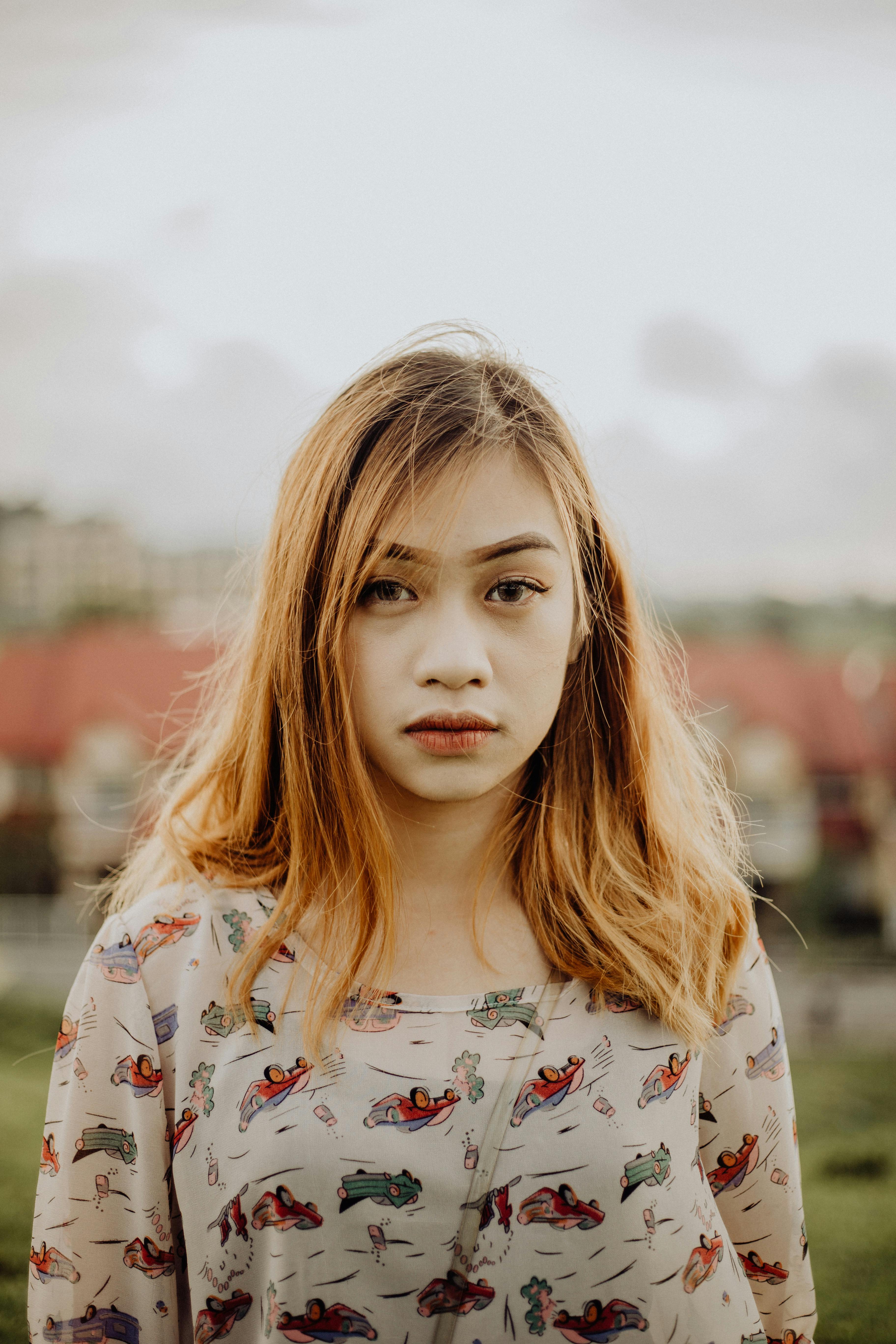 Close-Up View of a Beautiful Woman Looking to Her Side · Free Stock Photo