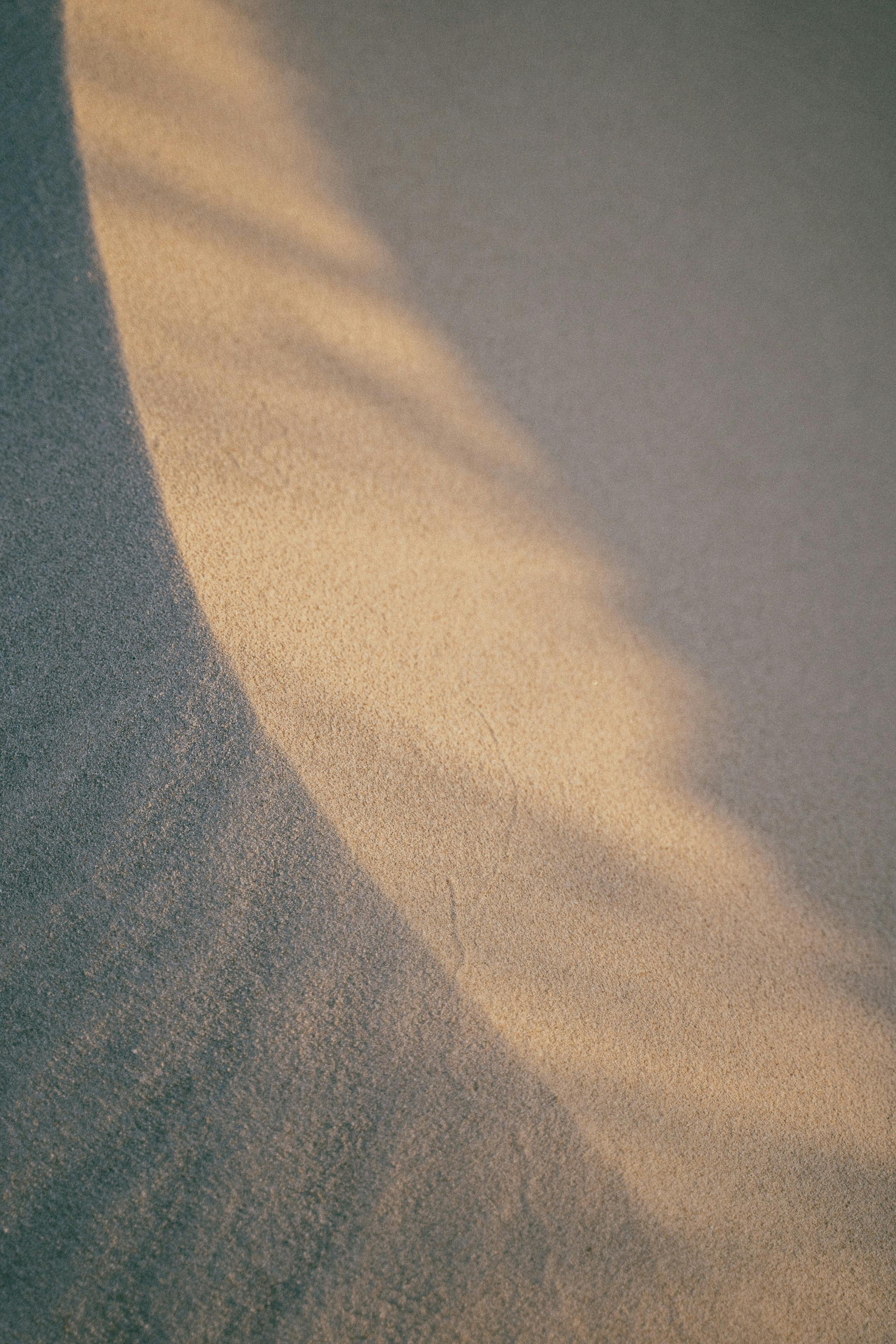 Close-Up Shot of Beach Sand · Free Stock Photo