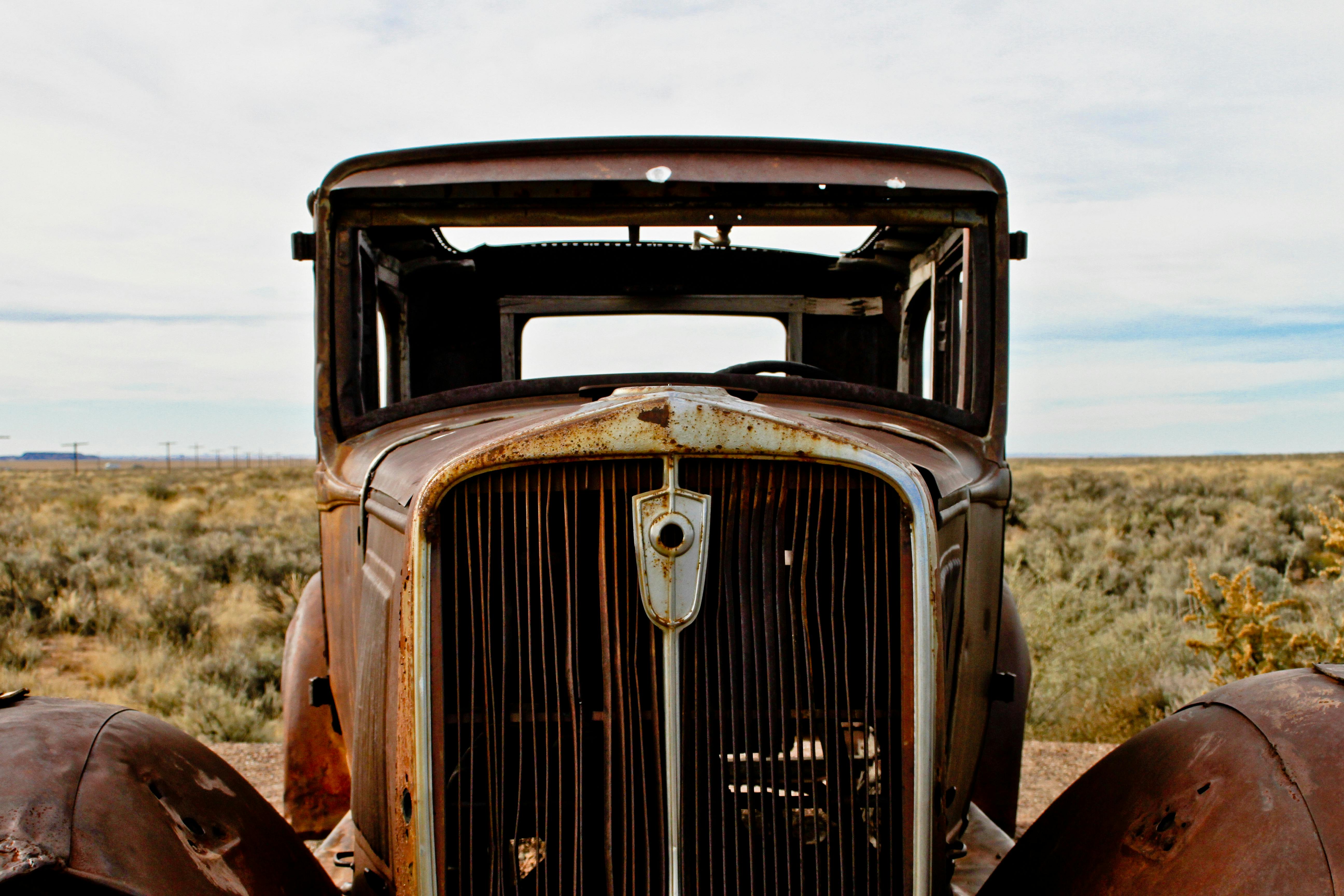 Brown Vintage Car on Brown Field · Free Stock Photo