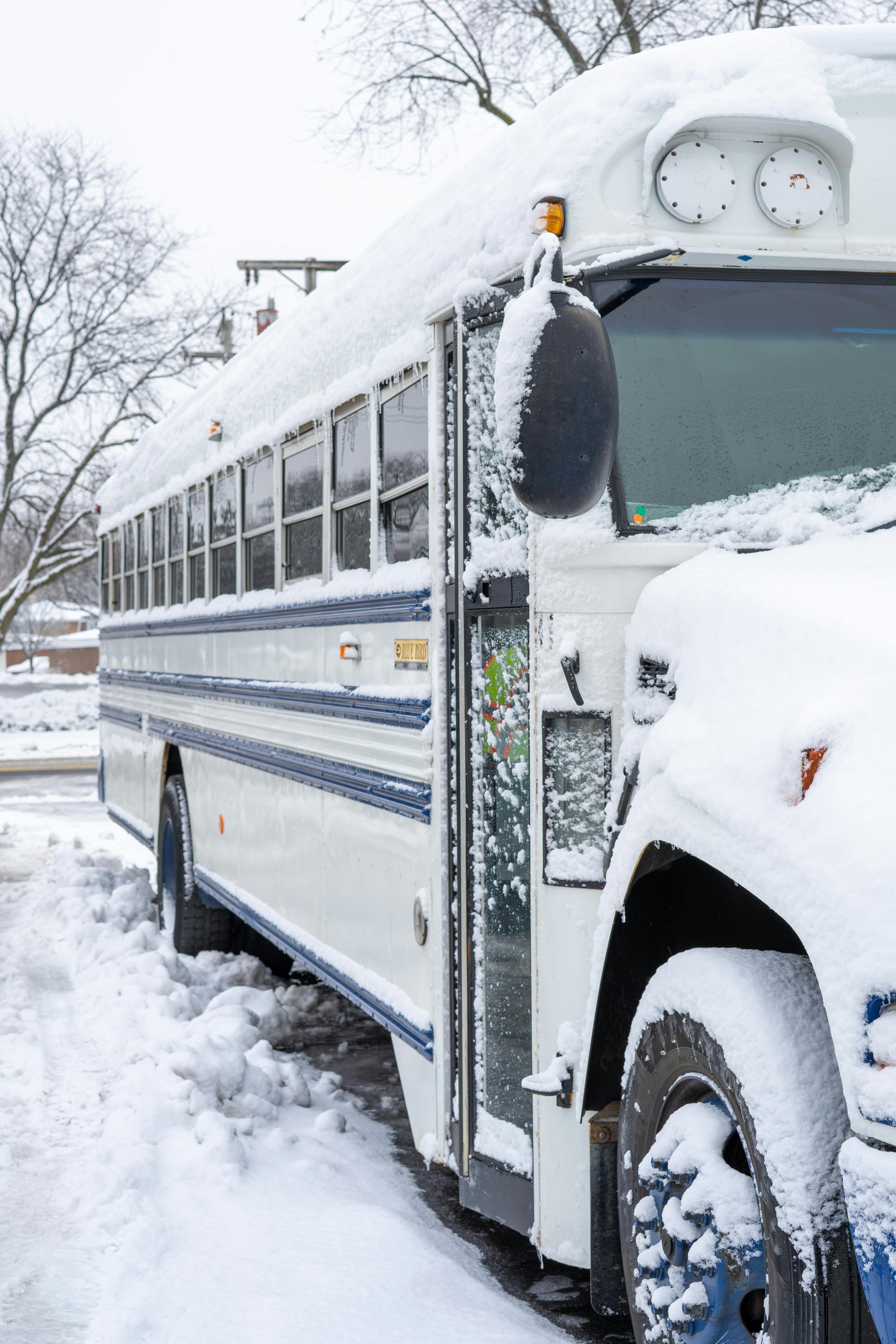 Side View of a Snow Covered Van · Free Stock Photo