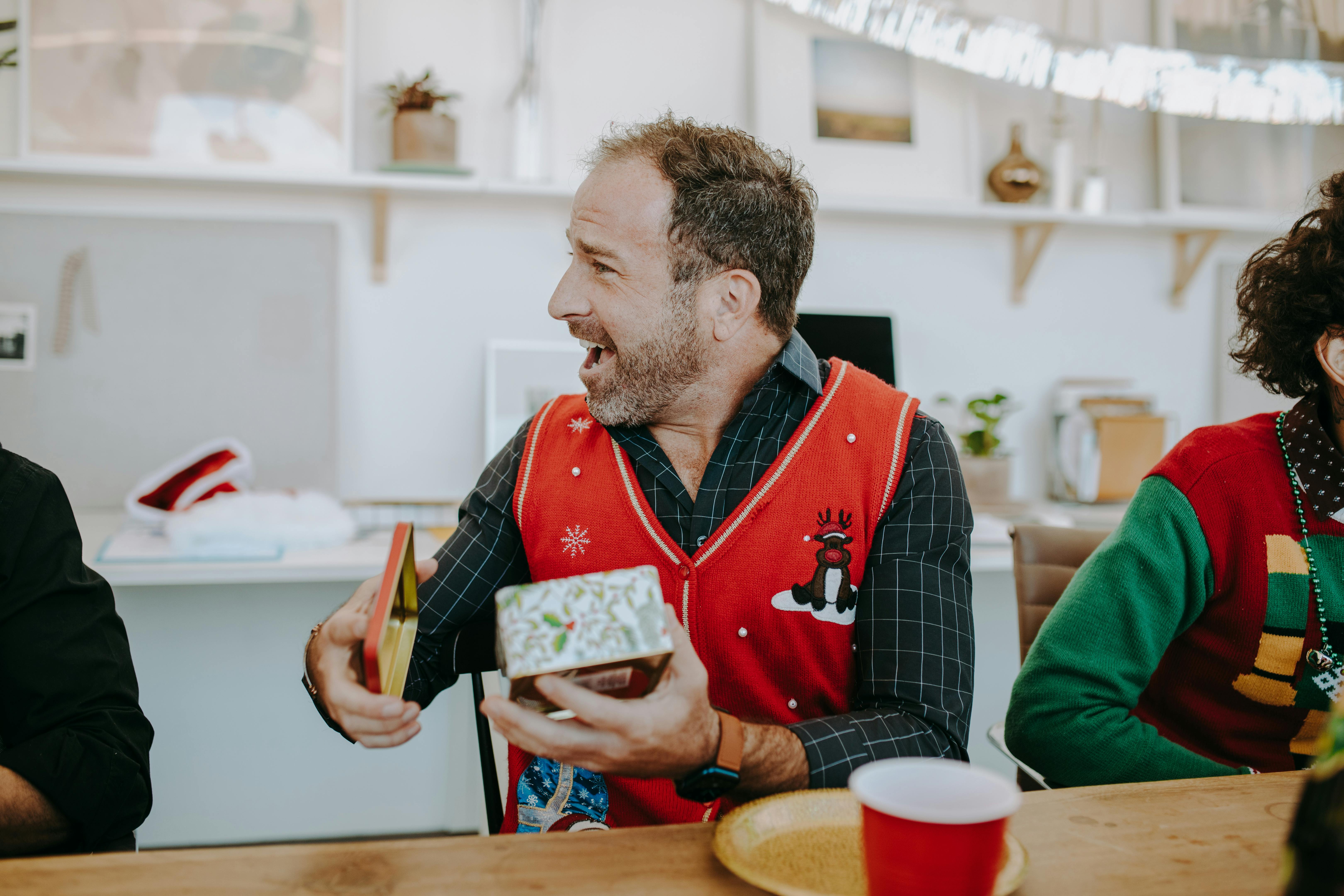 A Man Opening a Box · Free Stock Photo