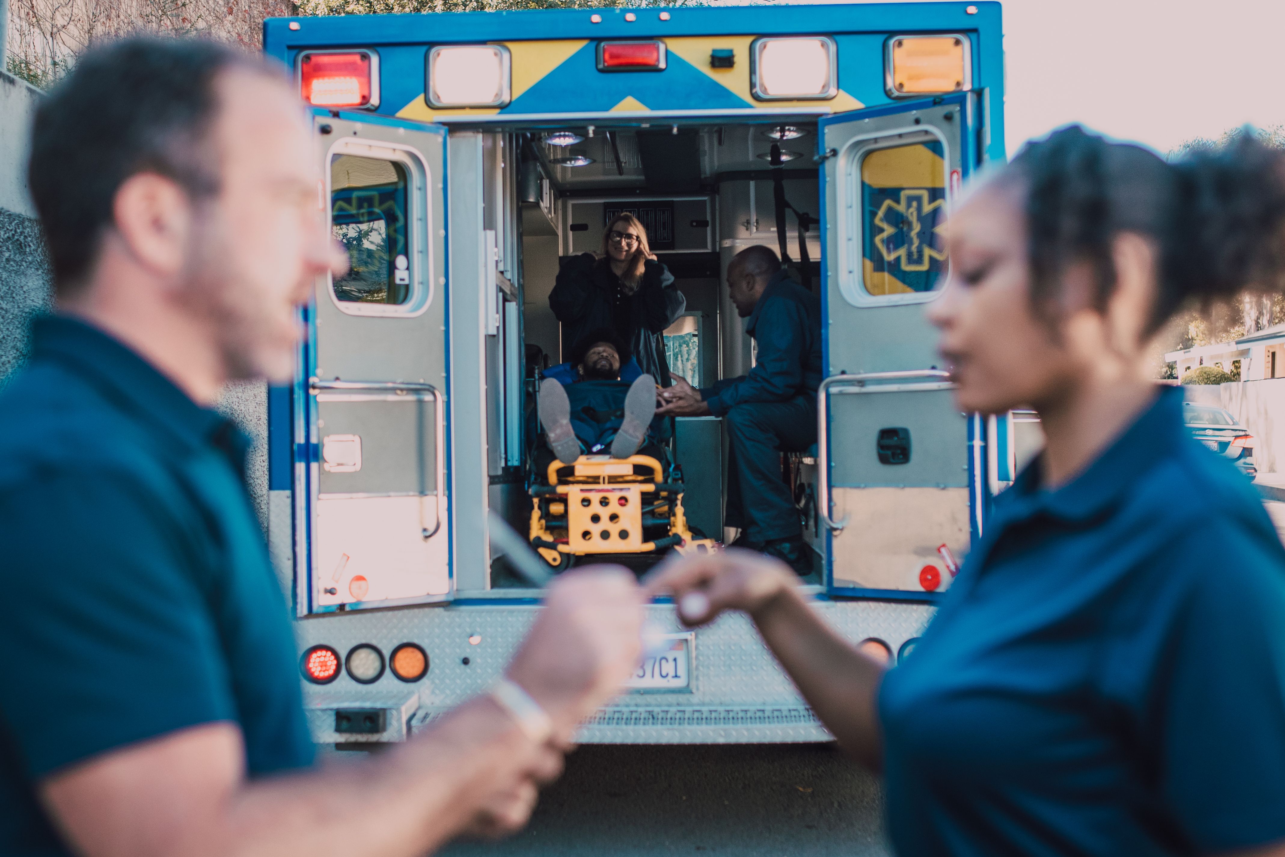Man Standing On An Ambulance · Free Stock Photo