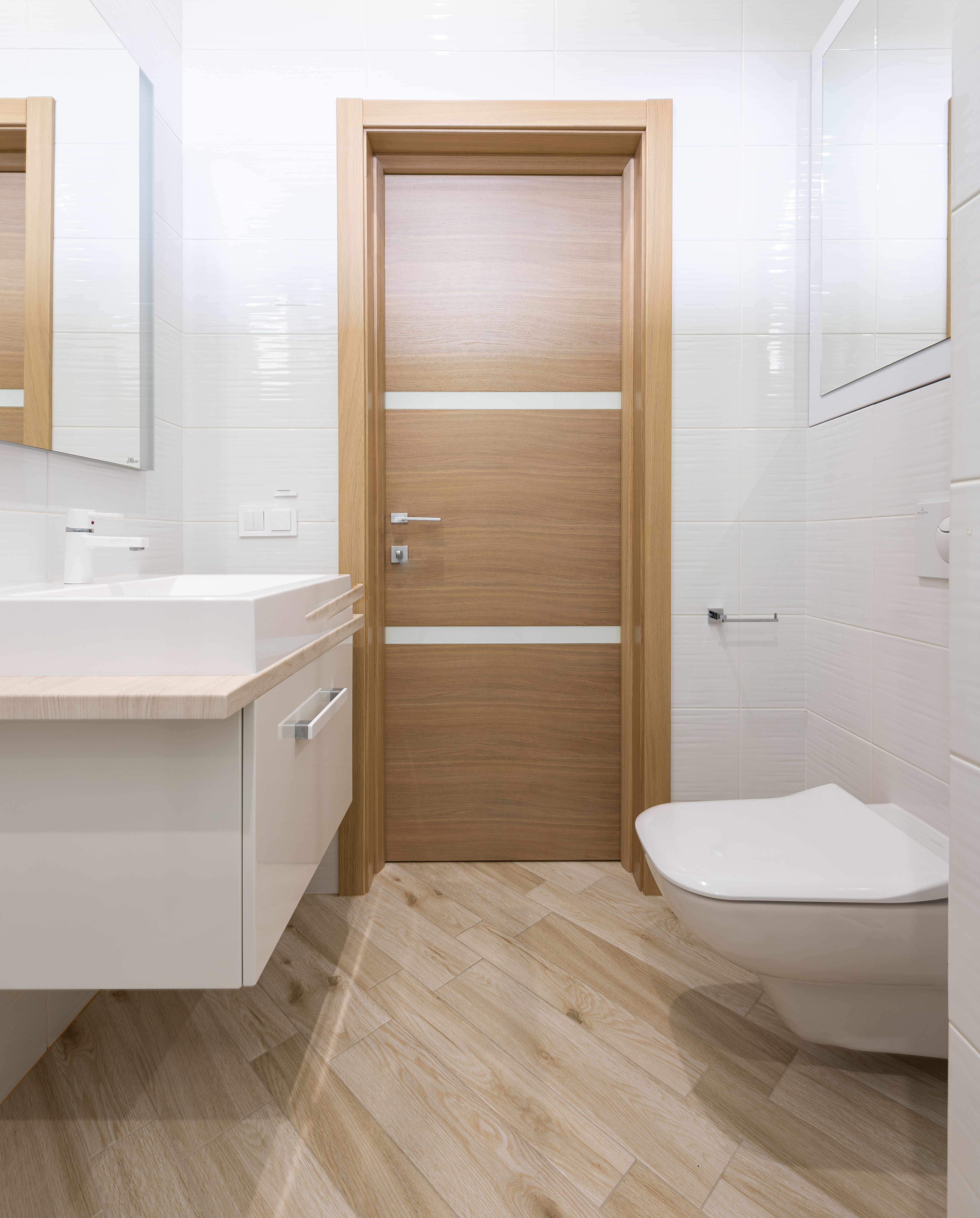 Wooden door of contemporary white bathroom · Free Stock Photo