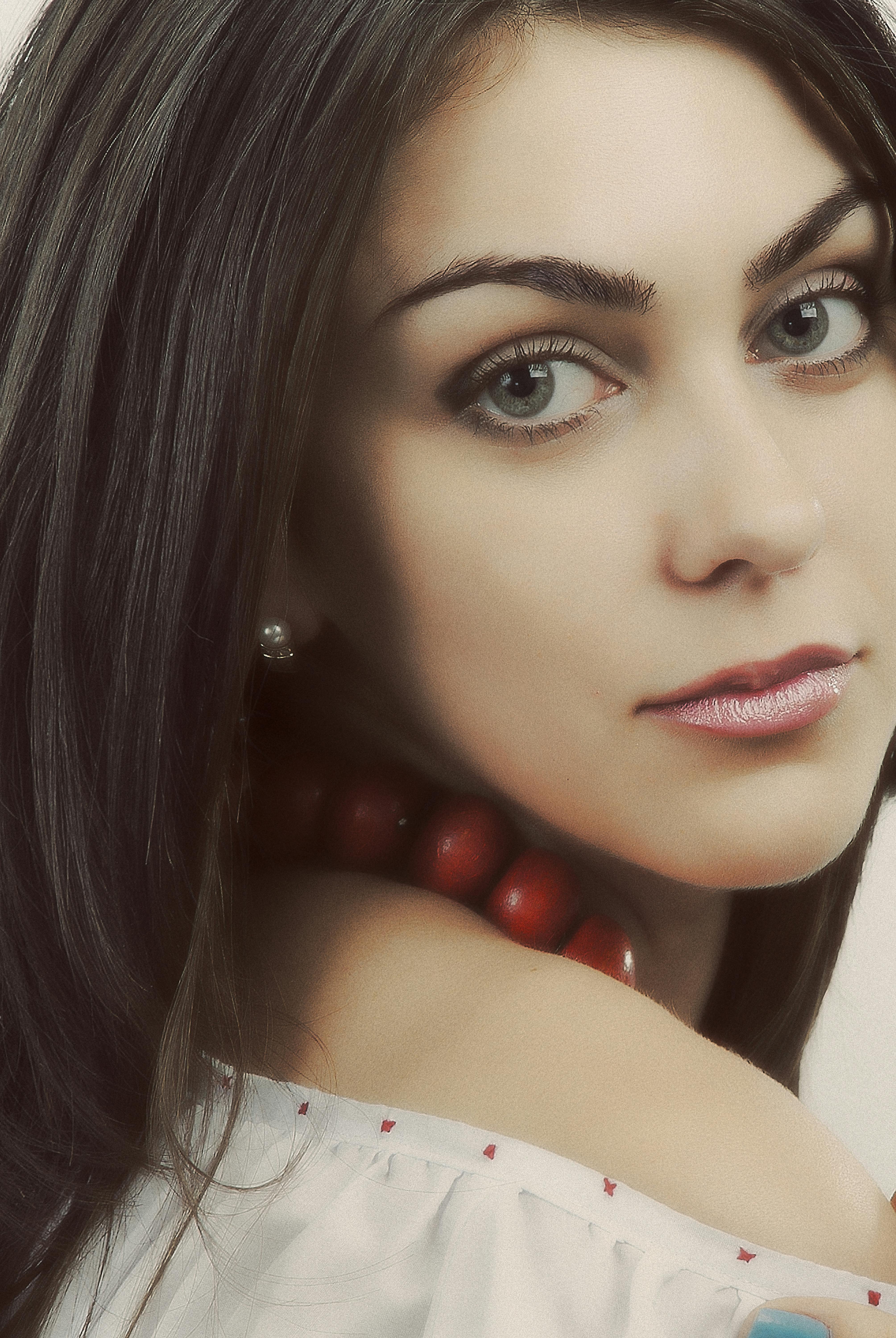 A Beautiful Woman Looking Over Her Shoulder · Free Stock Photo