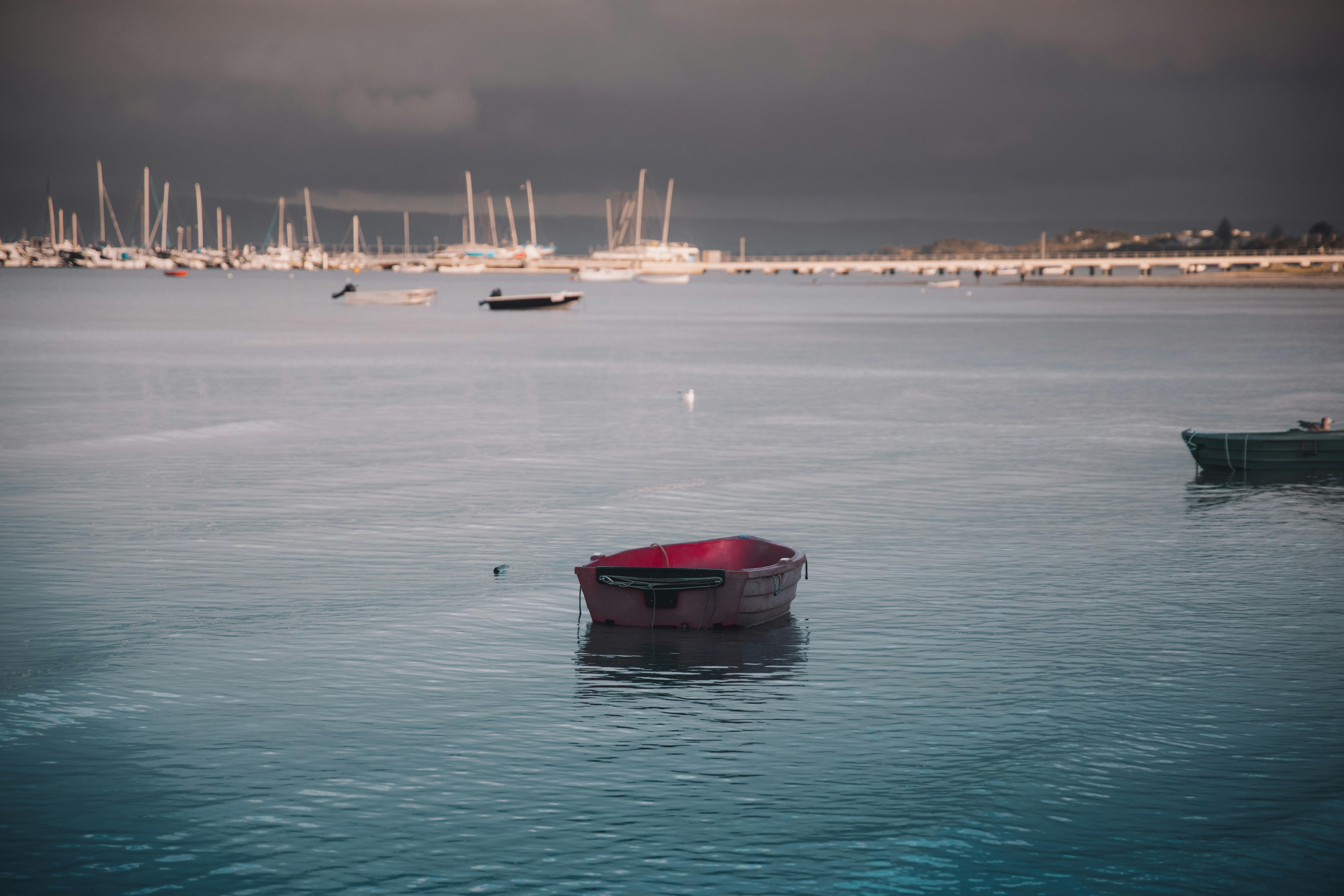 A Red Boat on the Sea · Free Stock Photo