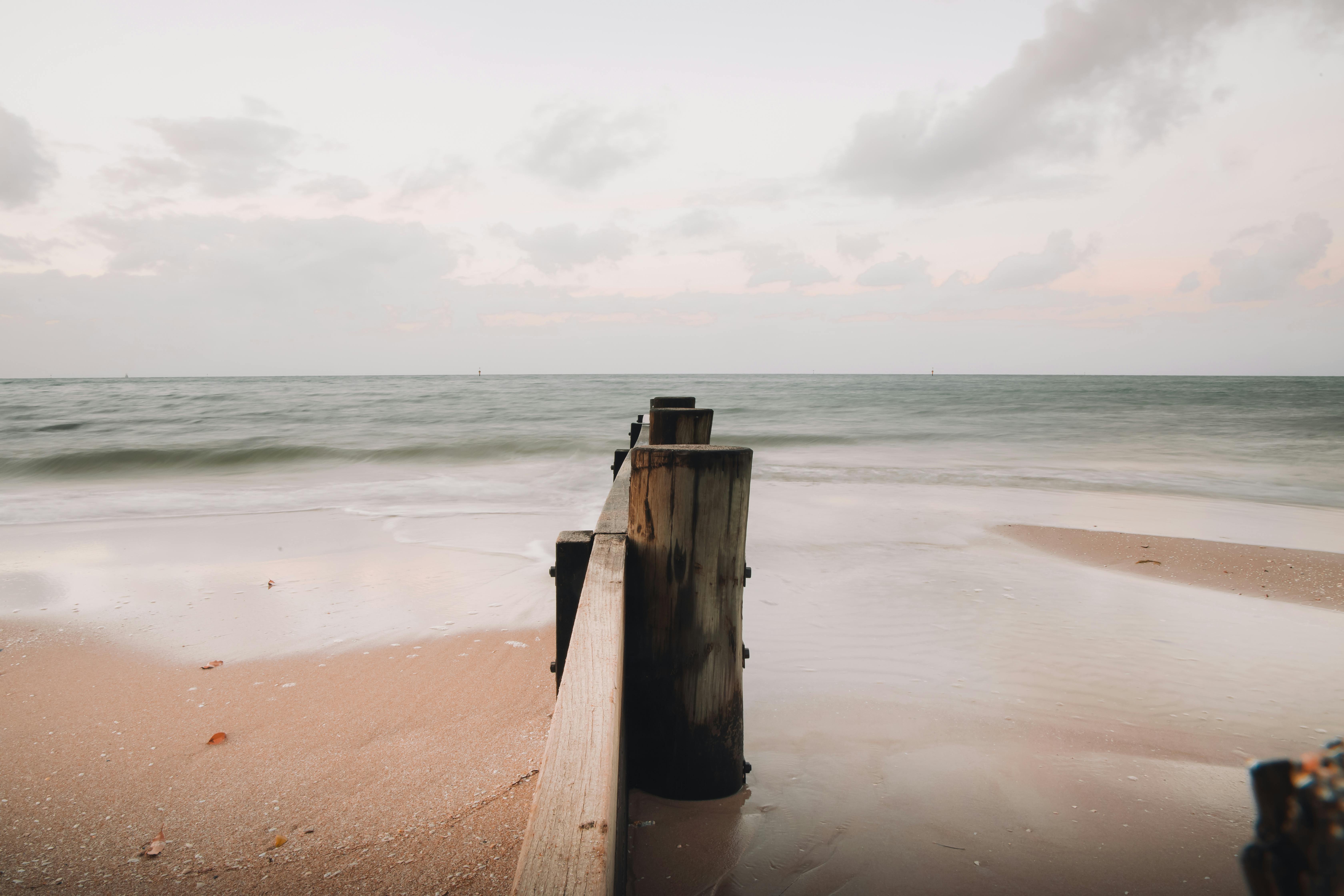 Brown Wooden Post on Beach · Free Stock Photo