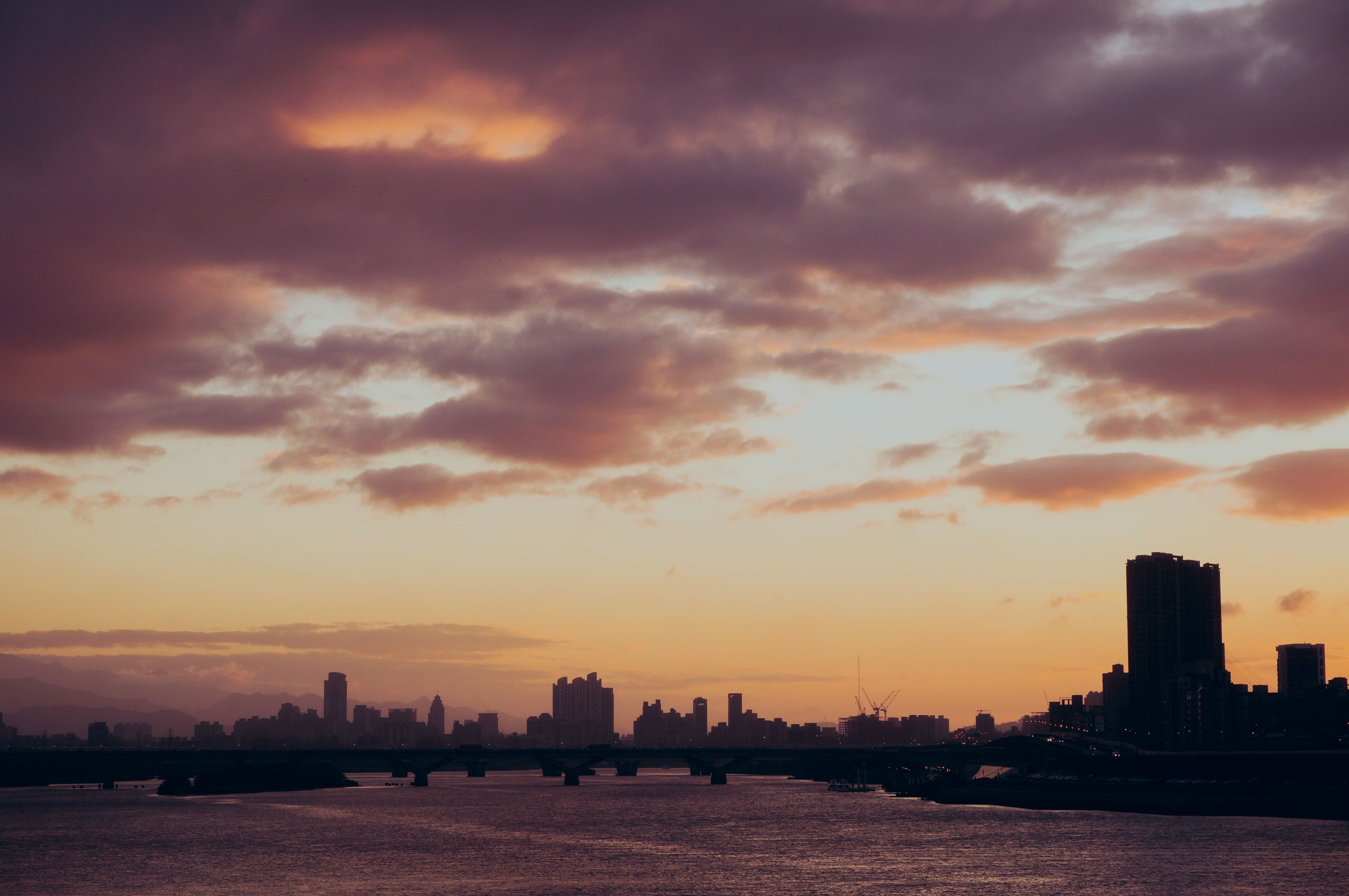 Monochrome Photo of City near River · Free Stock Photo