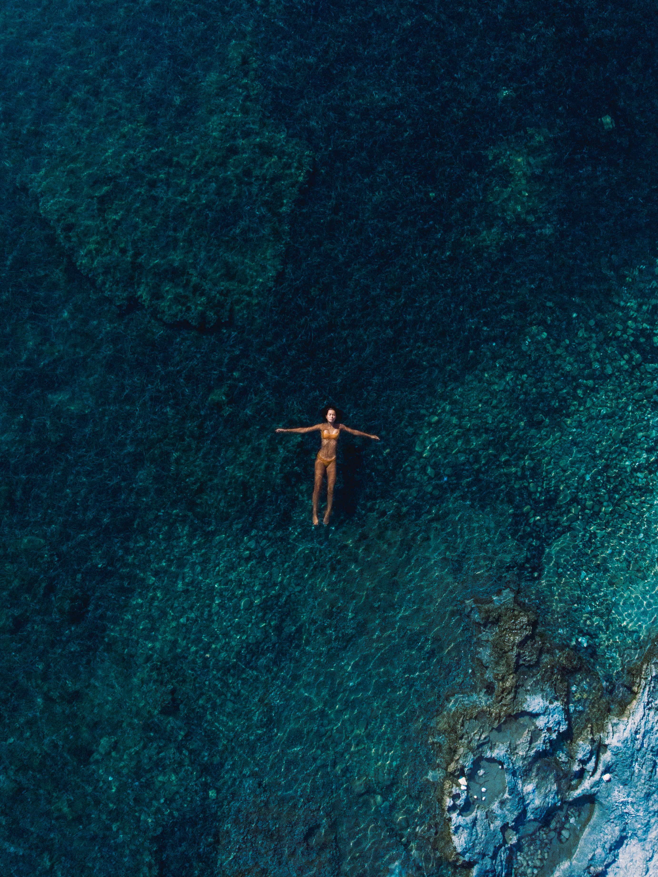 Woman Swimming on Turquoise Water of the Sea · Free Stock Photo