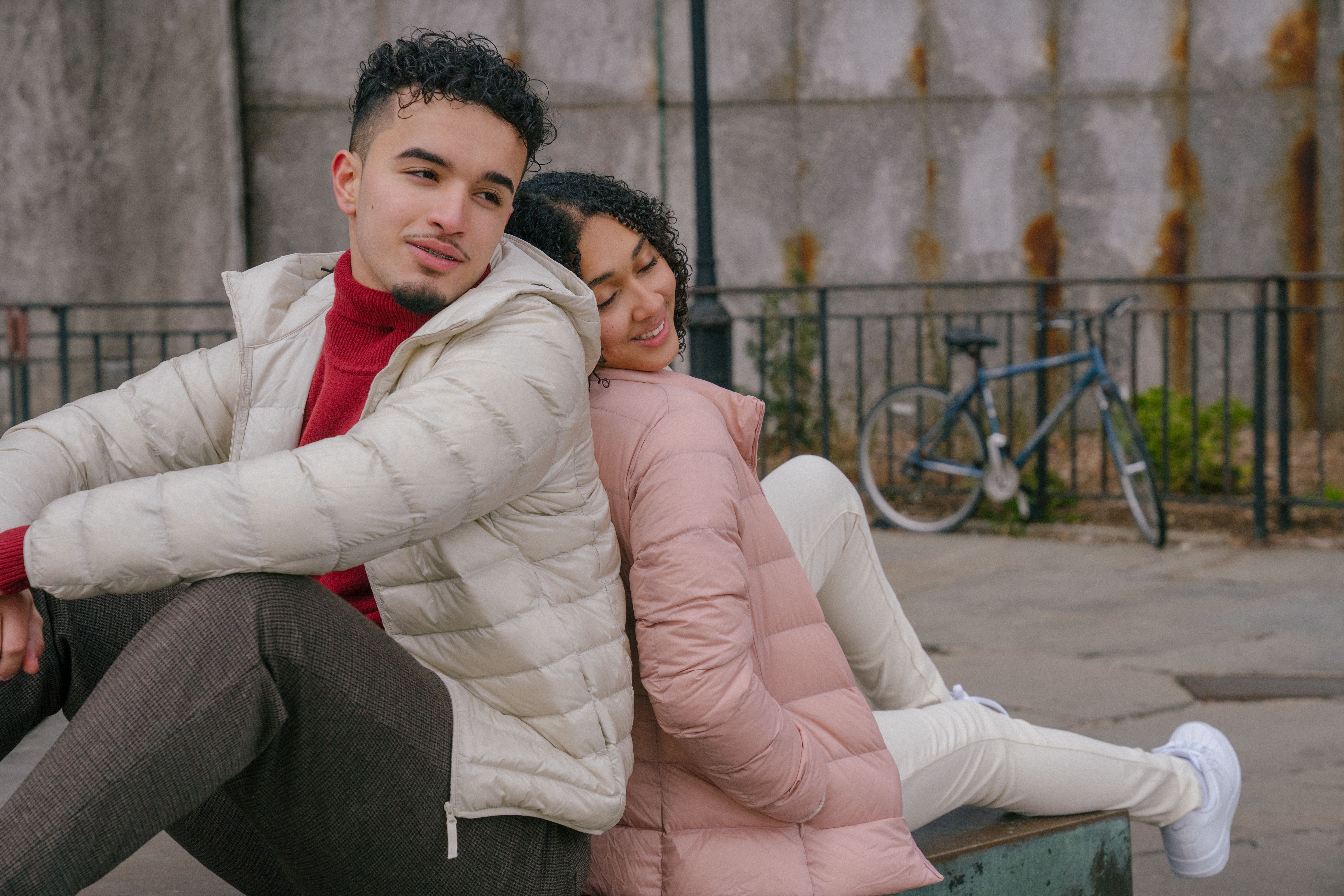 Romantic Hispanic couple recreating in park during date · Free Stock Photo