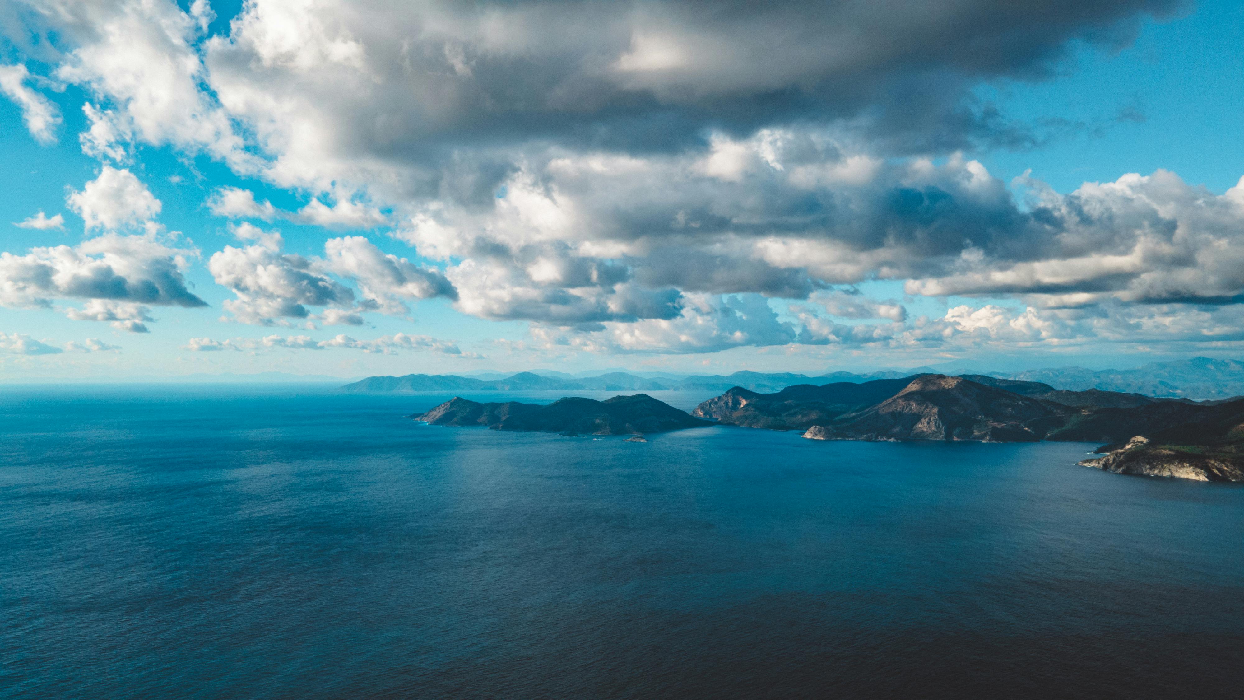 An Aerial View of a Landscape Surrounded by the Sea · Free Stock Photo