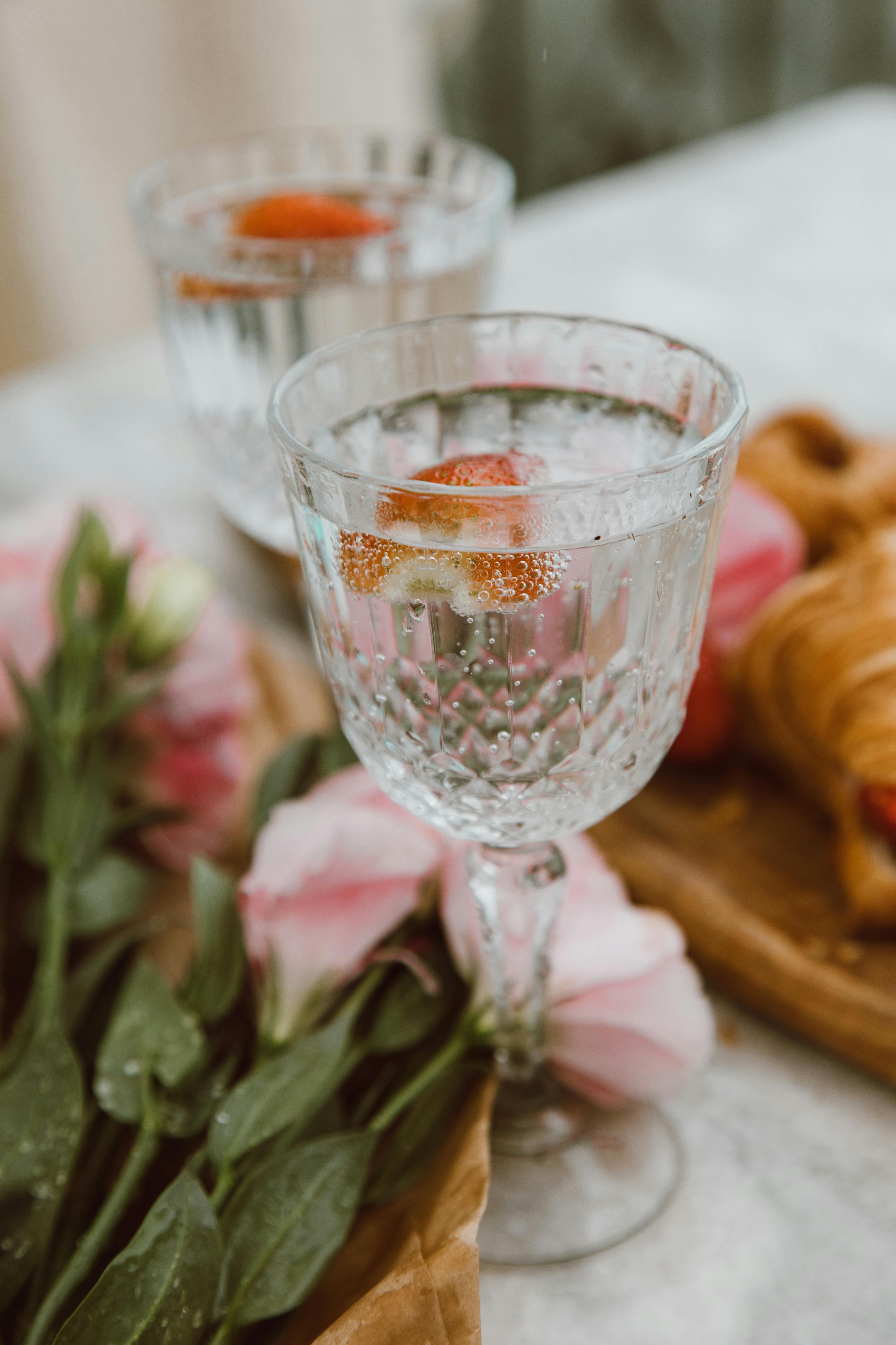 Person Drinking Tea at Table · Free Stock Photo