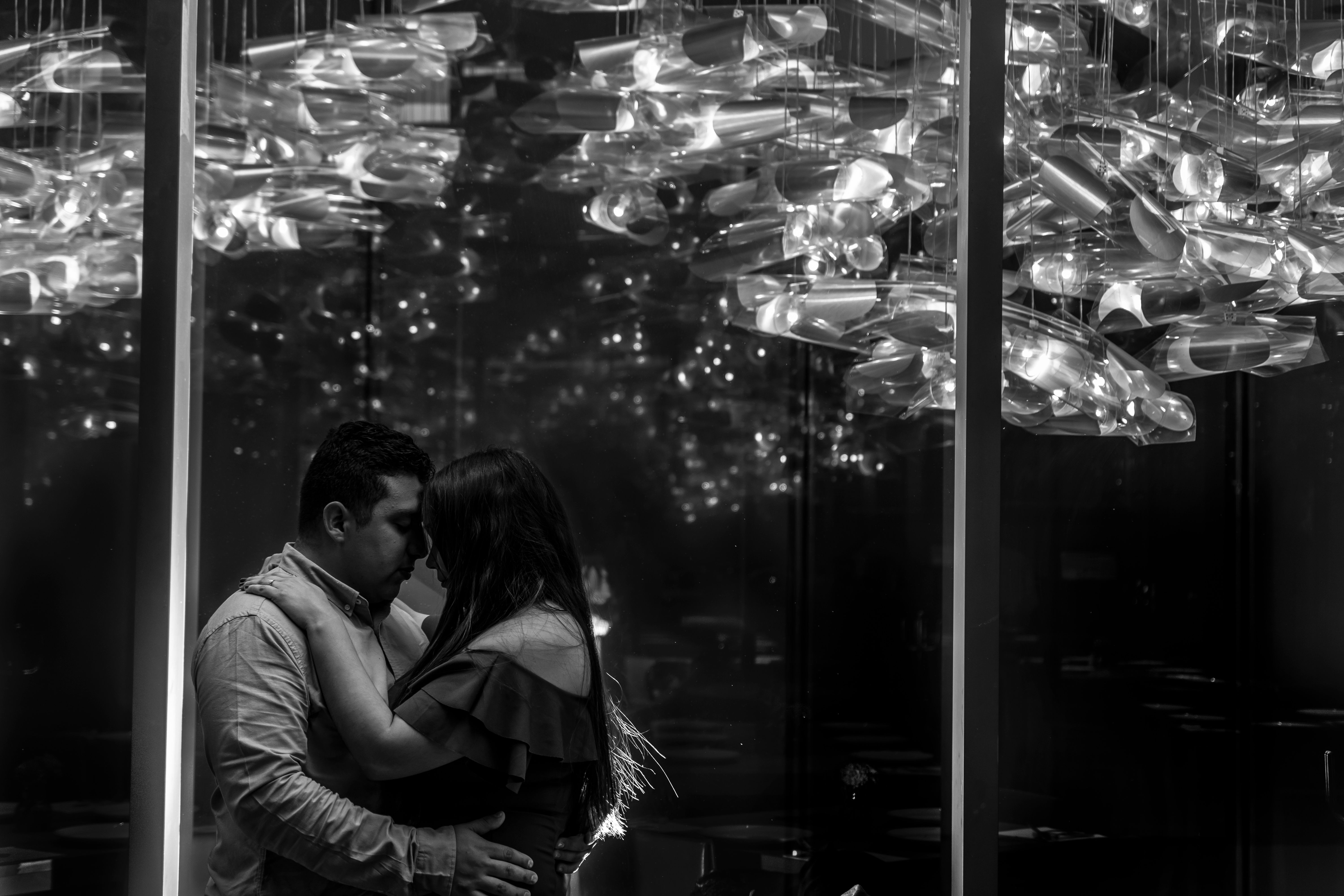 Grayscale Photo of a Romantic Couple Kissing · Free Stock Photo