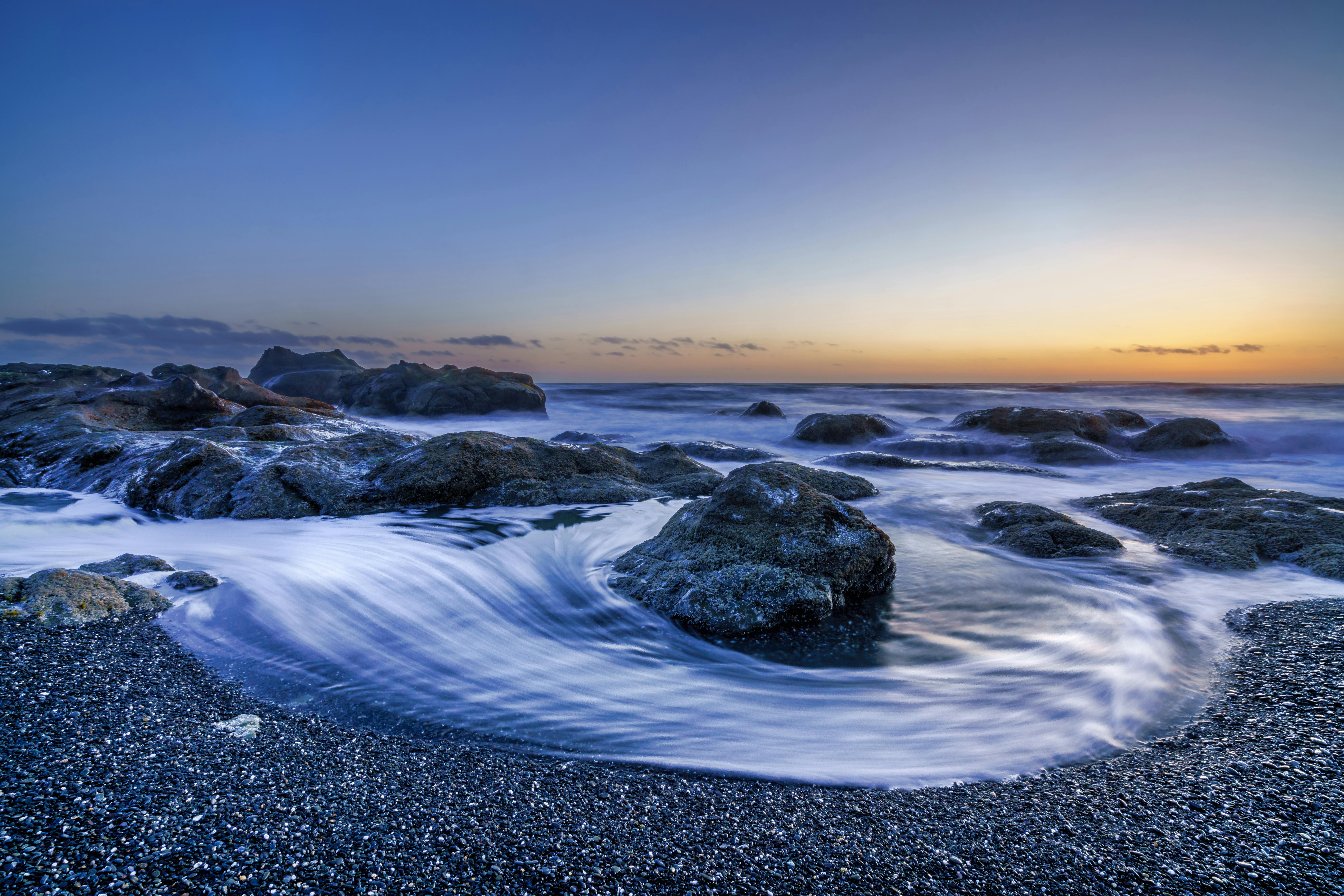 Scenic View of Sea Against Dramatic Sky · Free Stock Photo