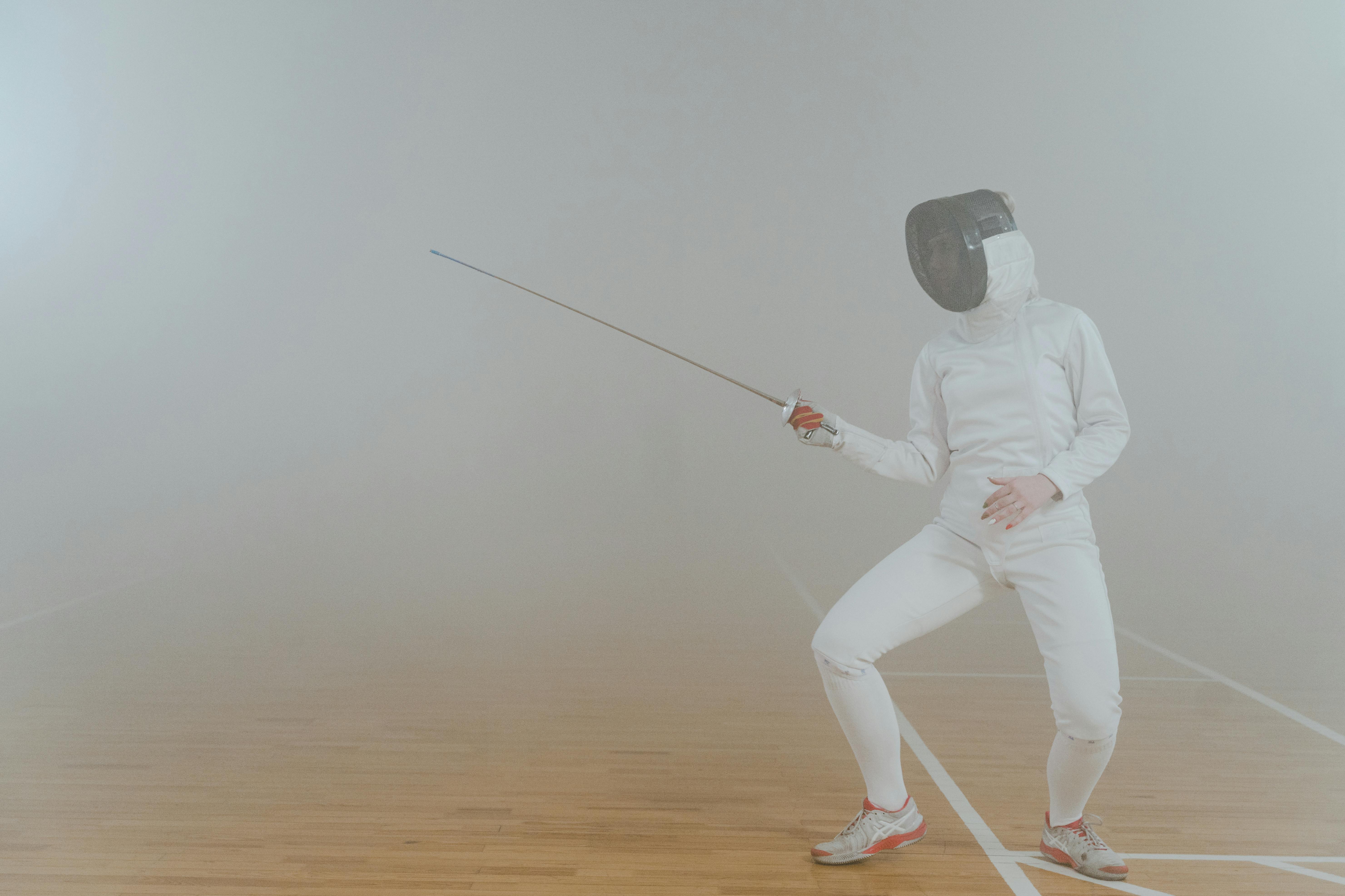 A Fencer in a Fighting Stance · Free Stock Photo