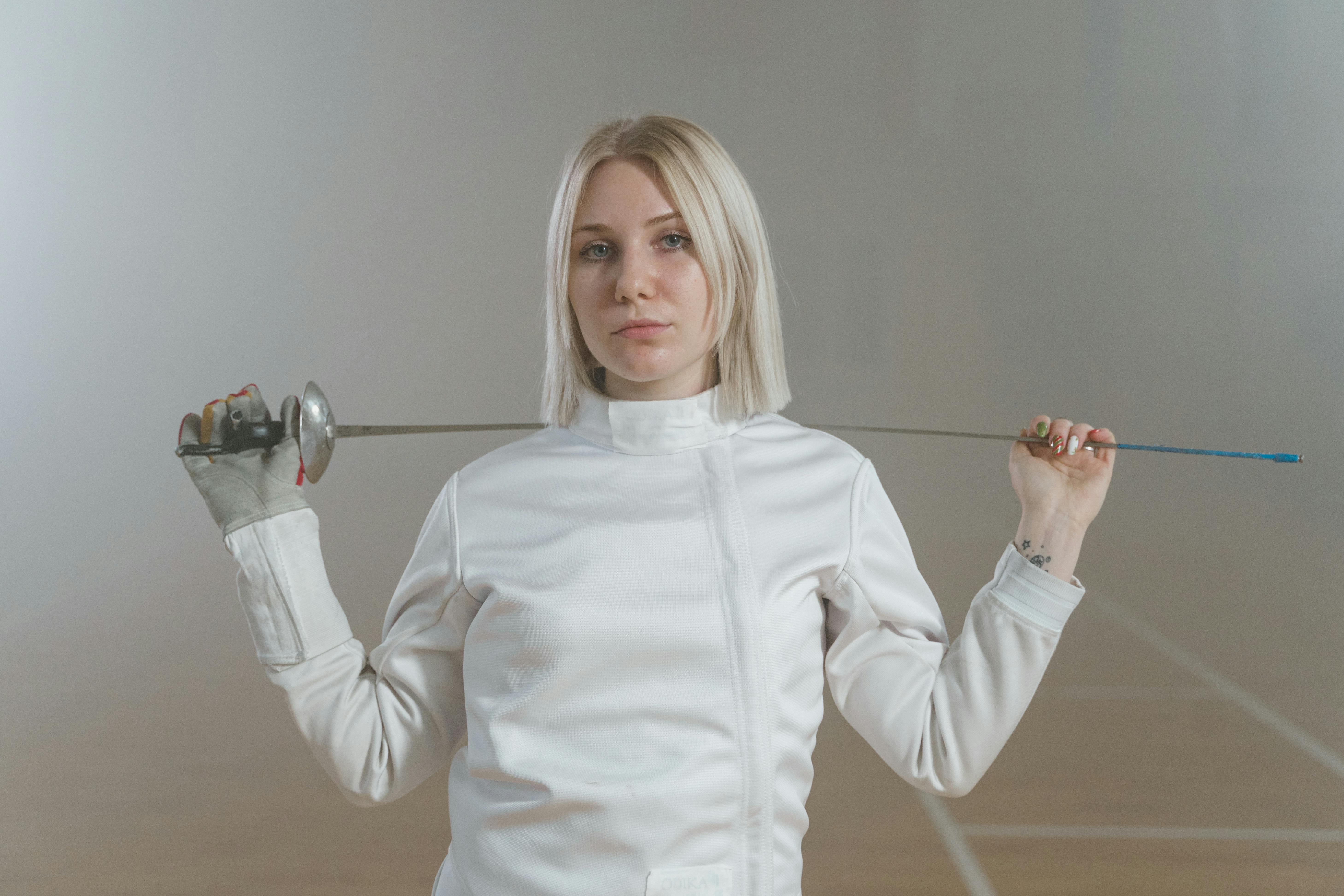 A Female Fencer in Her Lame · Free Stock Photo
