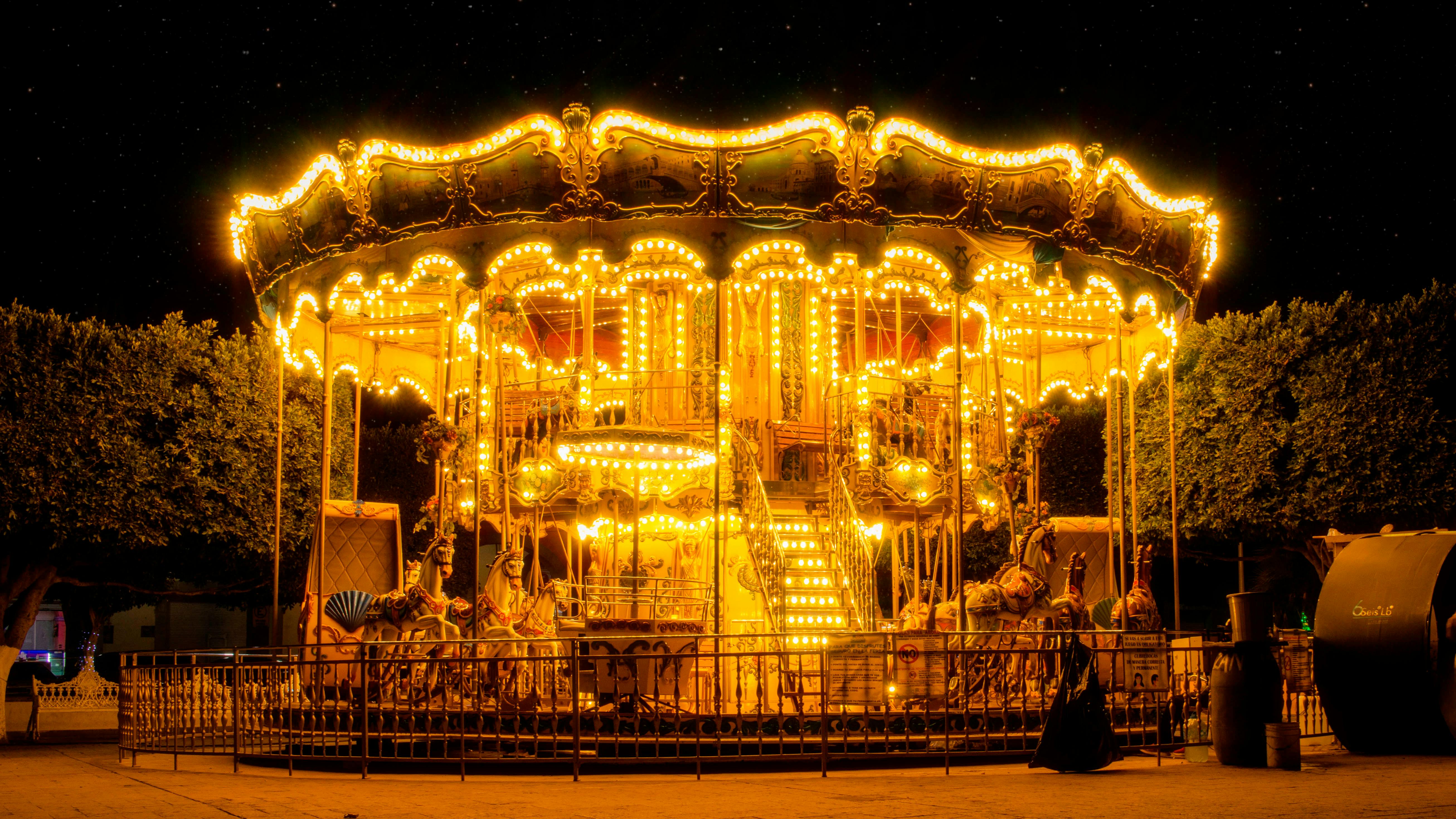 Illuminated Carousel at Dusk · Free Stock Photo