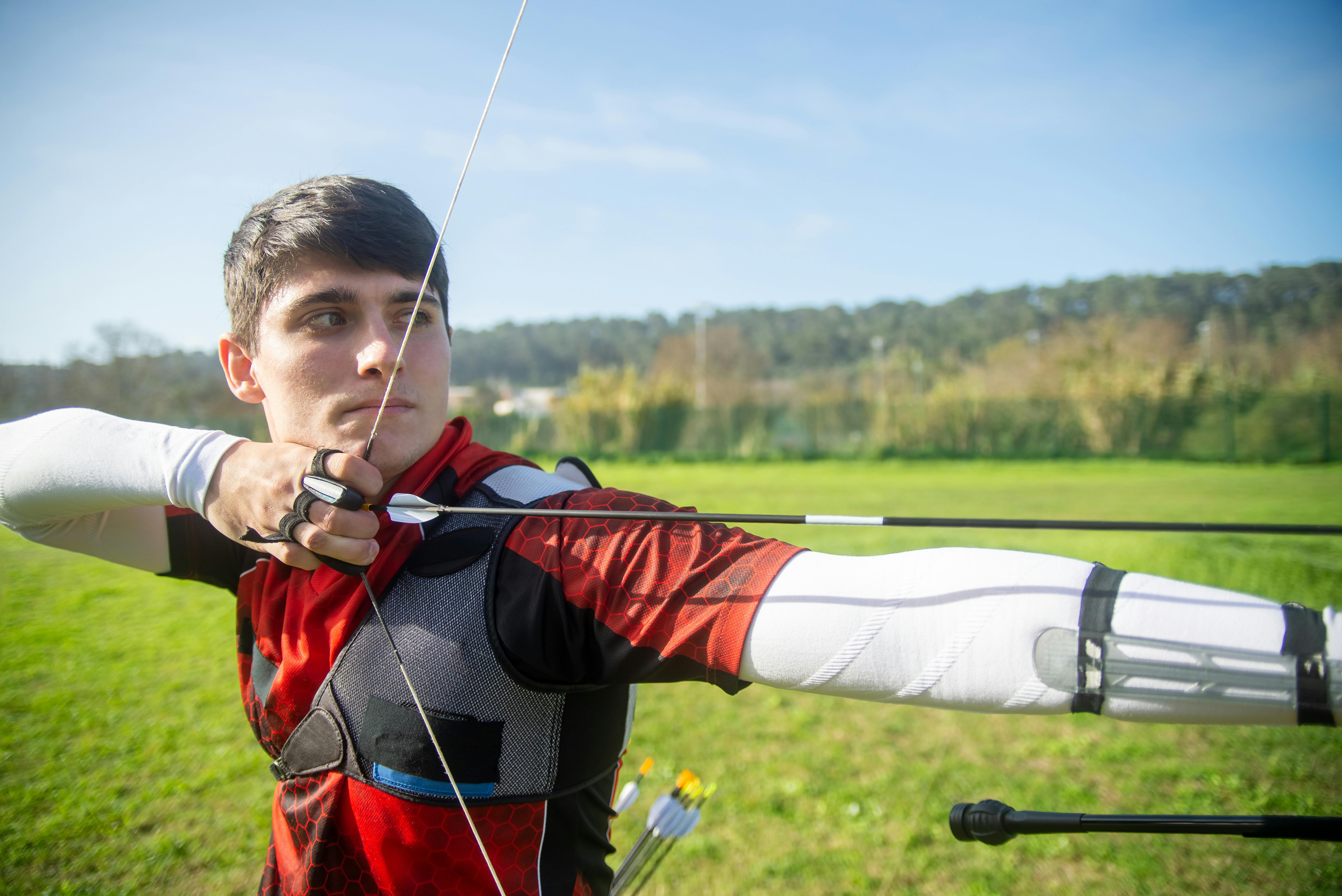 Archer aiming on an Archery Target · Free Stock Photo