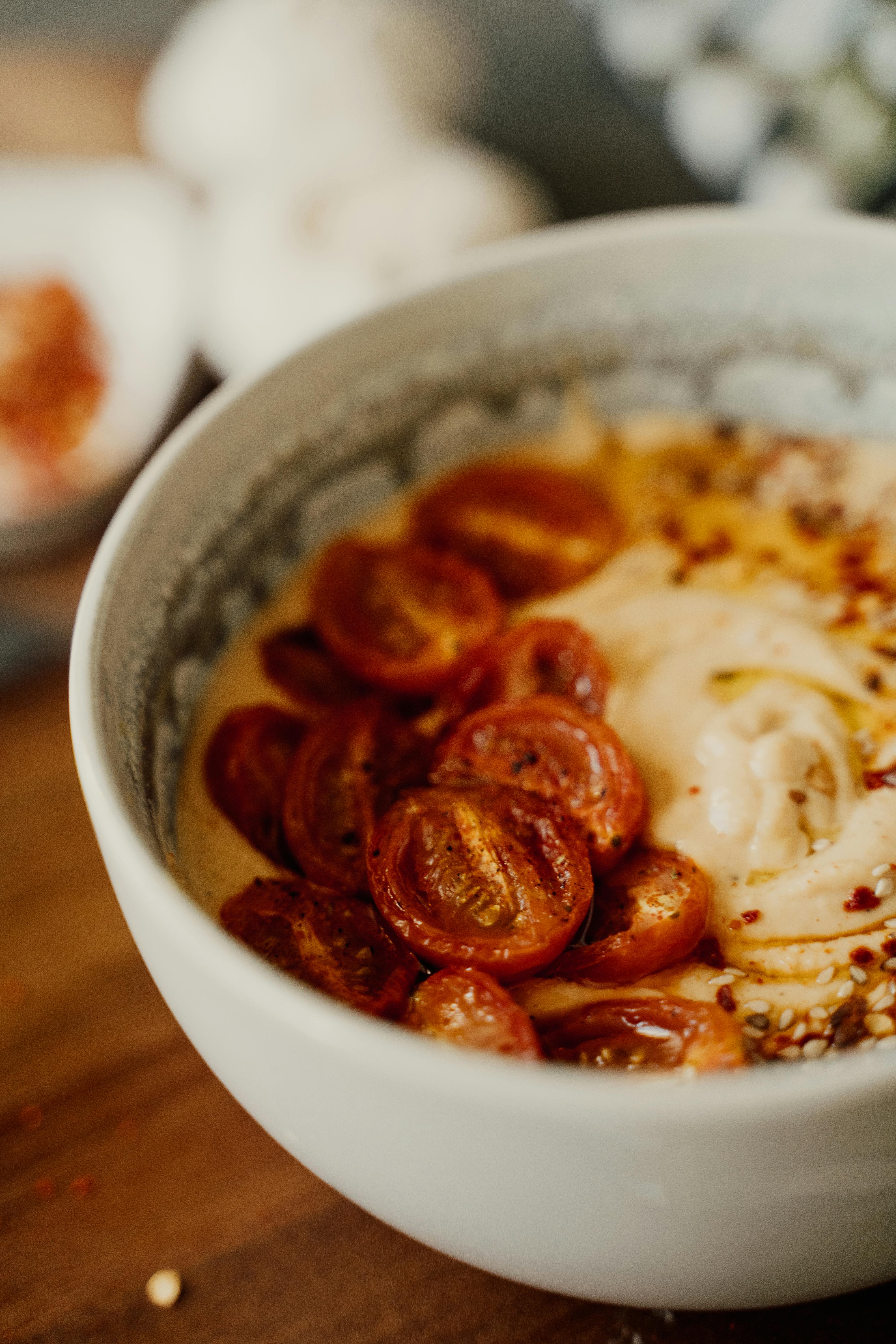 Close-Up Shot of a Hummus in a Bowl · Free Stock Photo