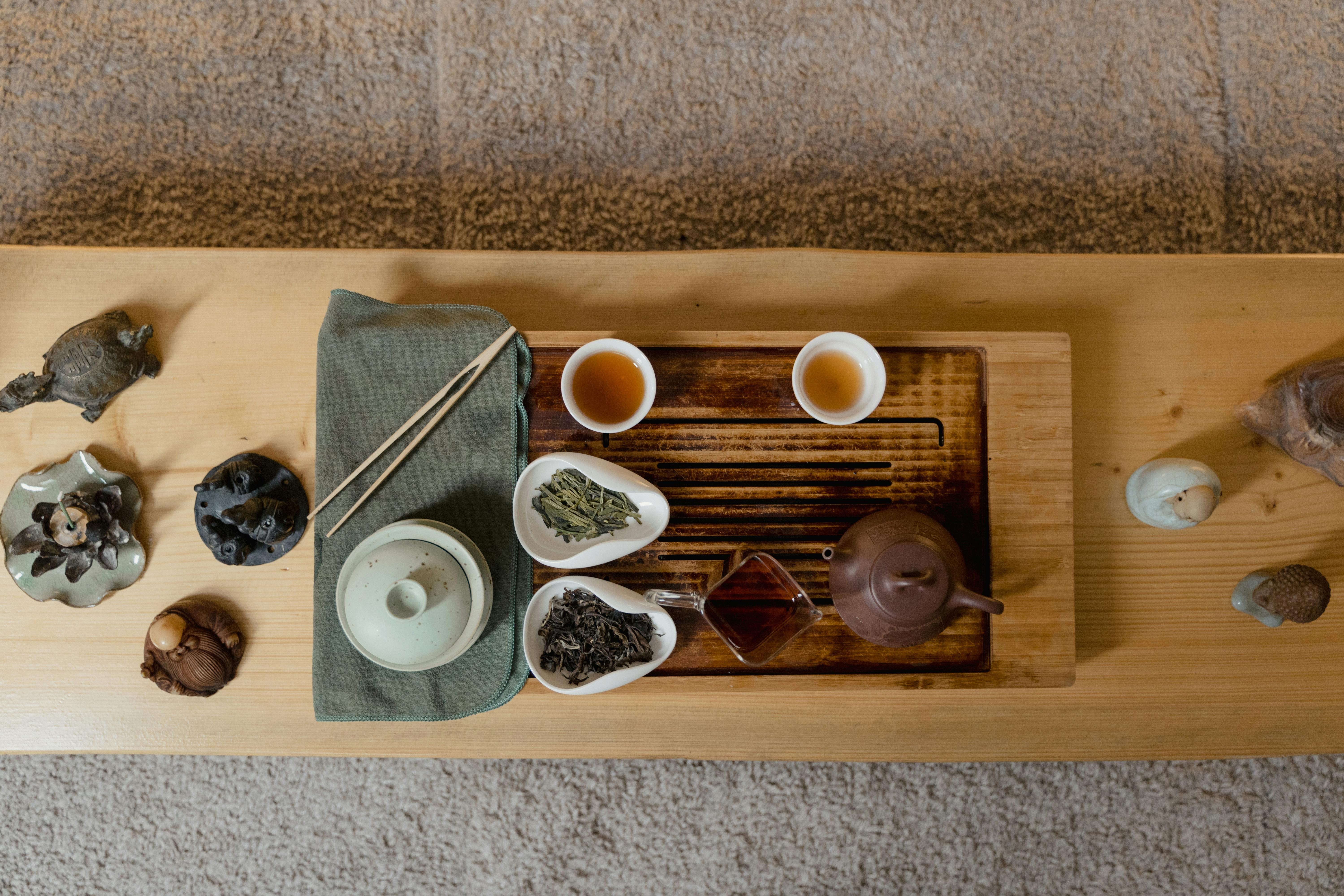 A Top Shot of a Tea Set on a Wooden Table · Free Stock Photo