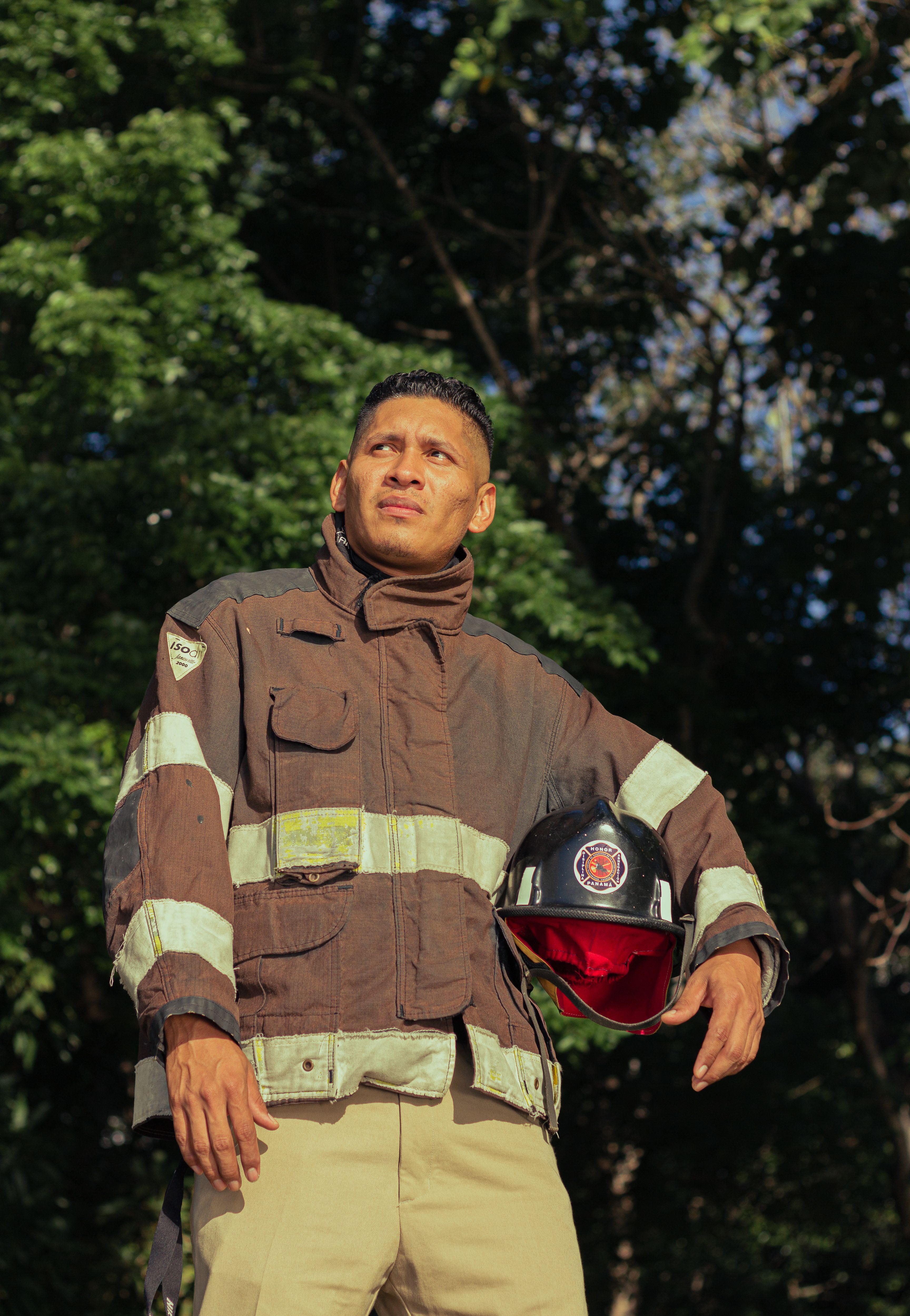 Yellow Hard Hat on Brown and Yellow Fireman's Suit · Free Stock Photo